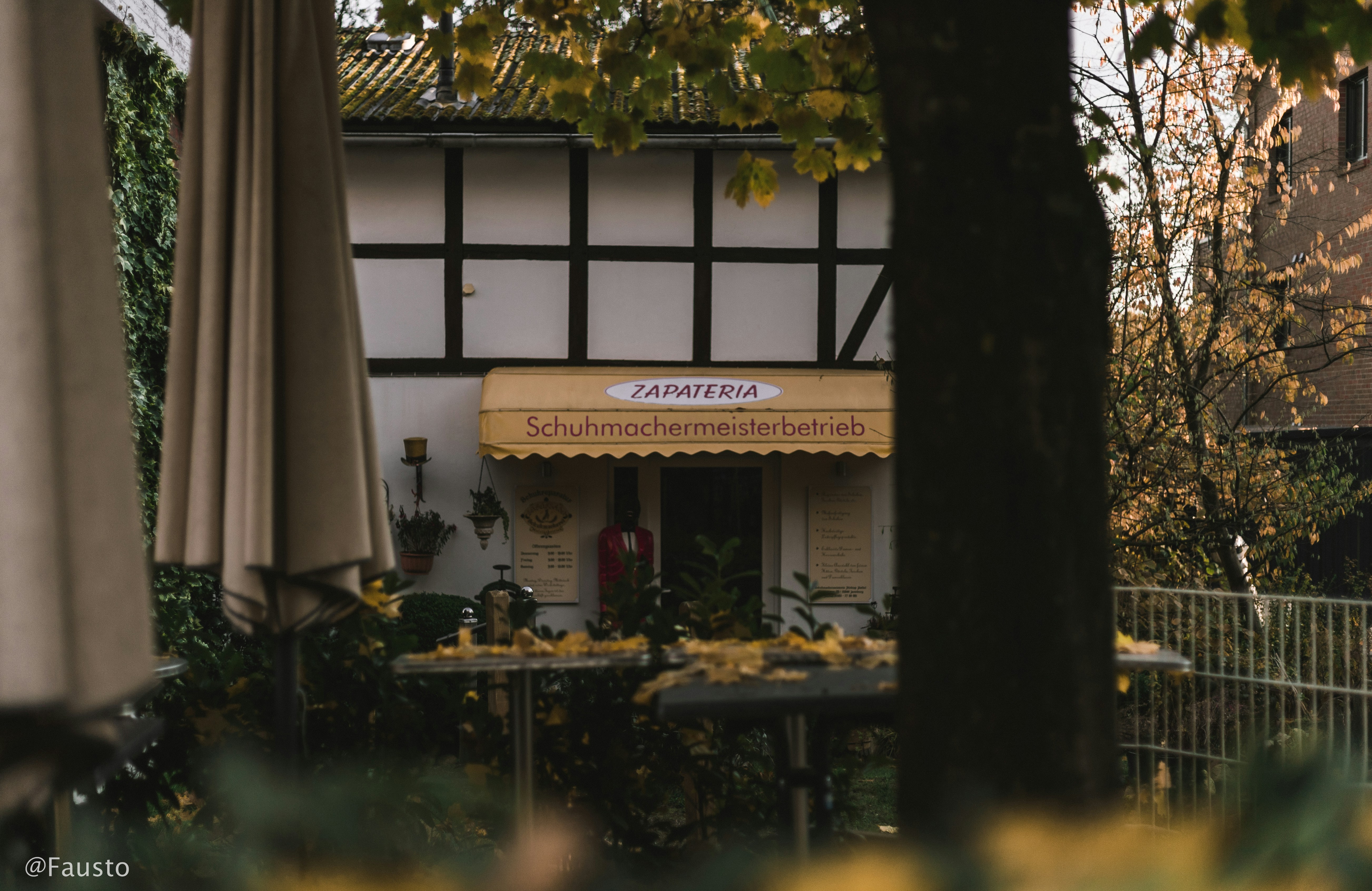 a restaurant with a large glass front