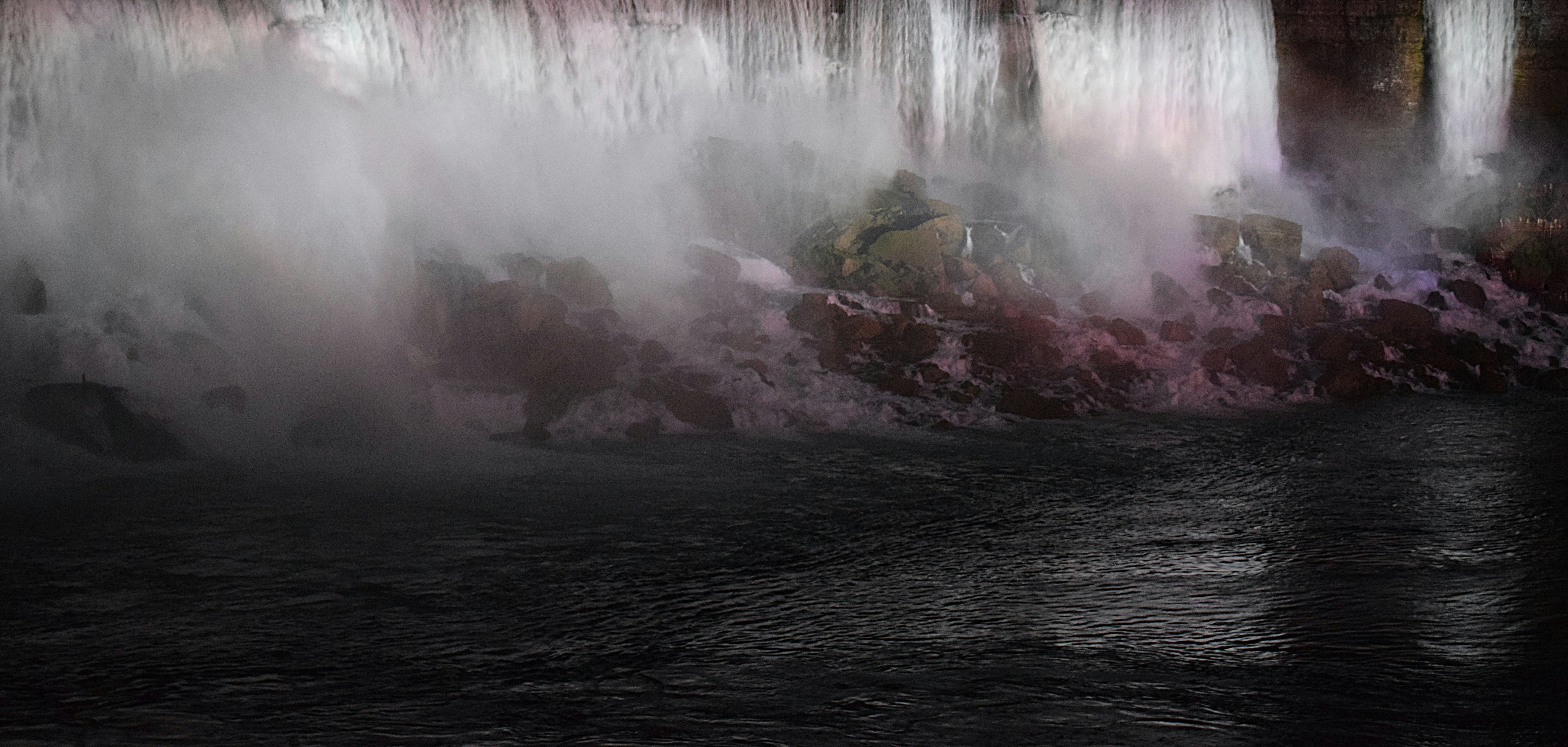 A body of water with smoke coming out of it photo – Free Niagara falls ...