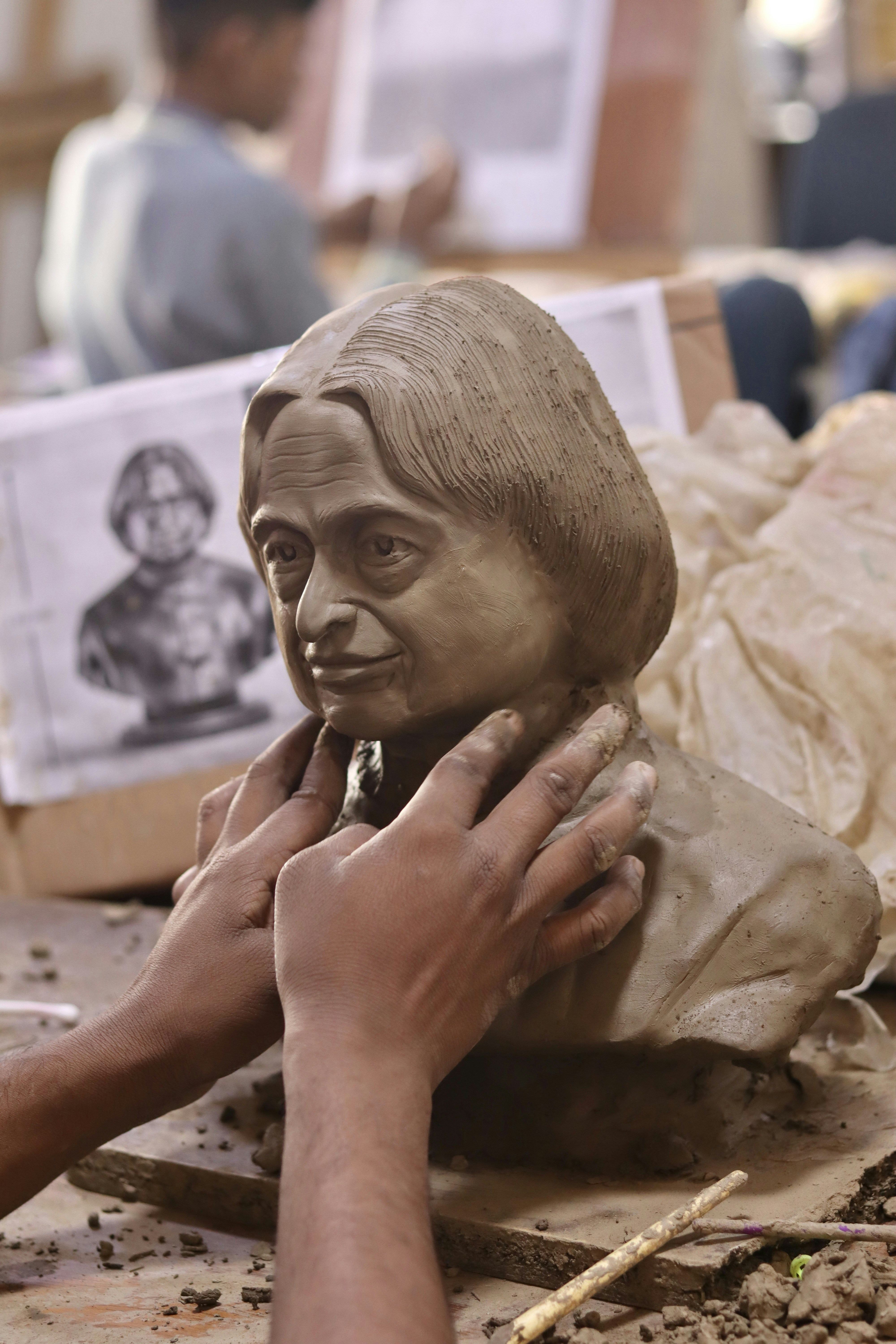 Hands-on Clay Portrait: Crafting a Quiet Moment in a Busy Studio