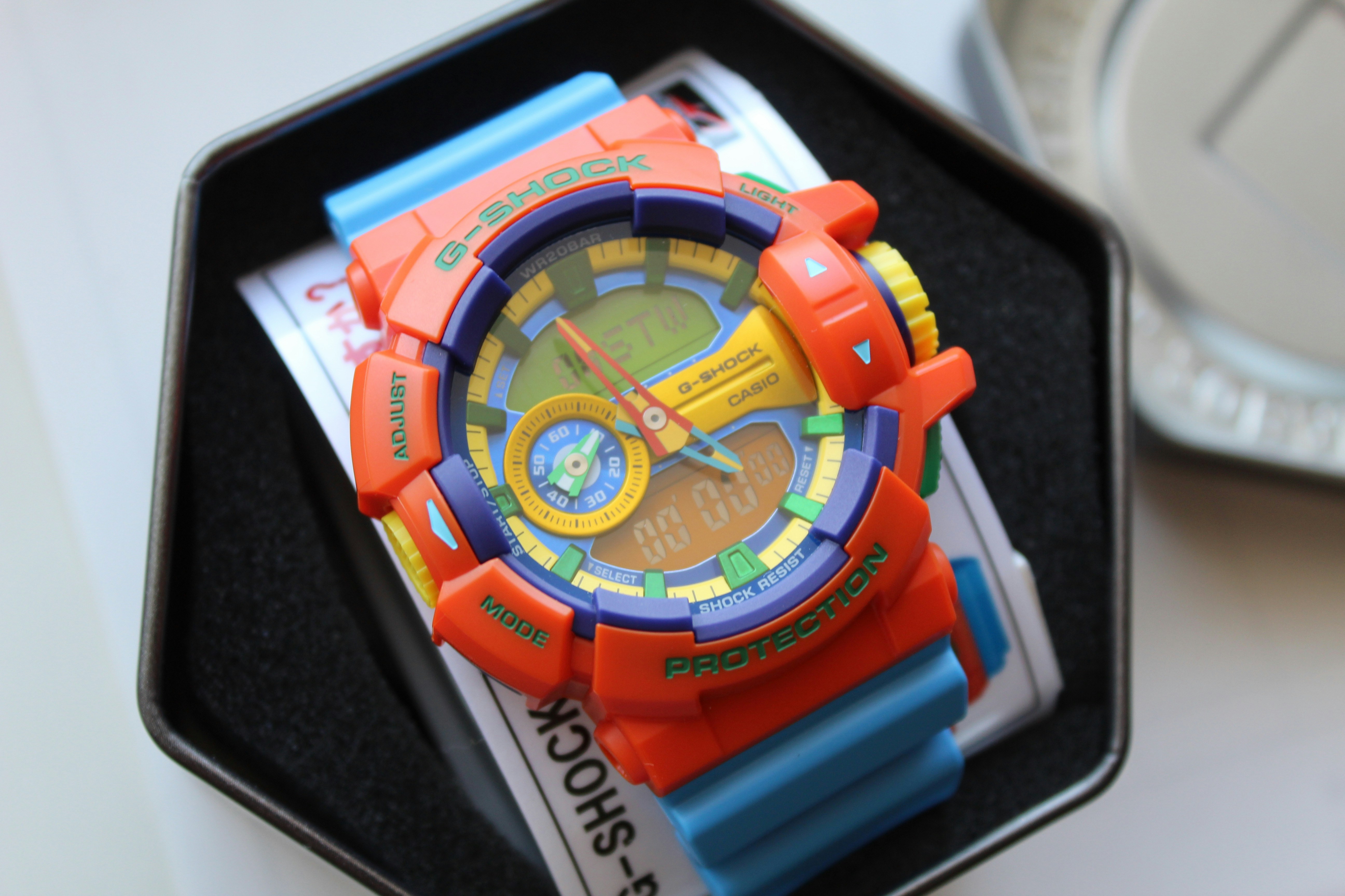 Color-Field Stopwatch: Bright Orange G-Shock on a Toy-Like Spin