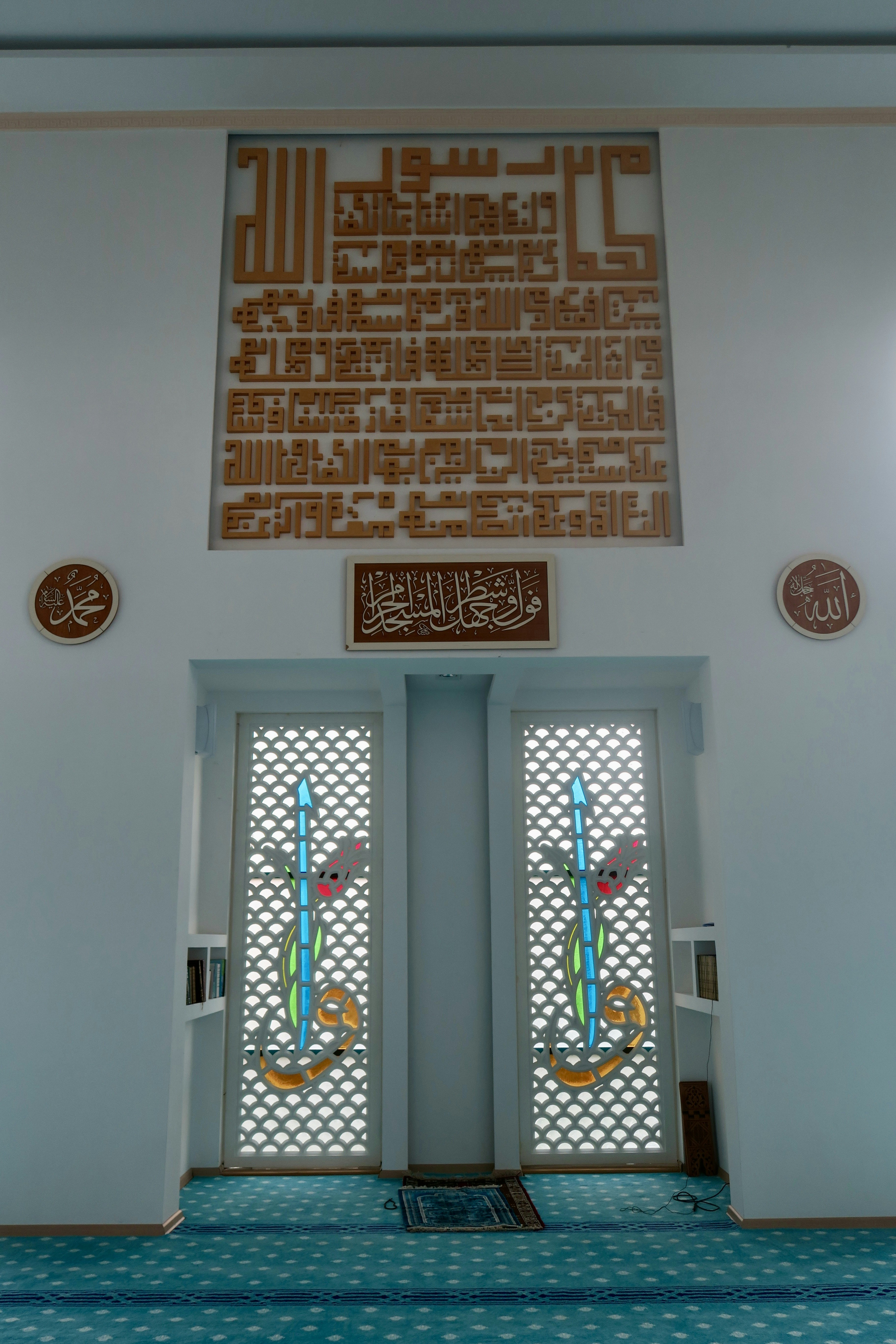 Latticed Light Through a Turquoise Mosque Doorway