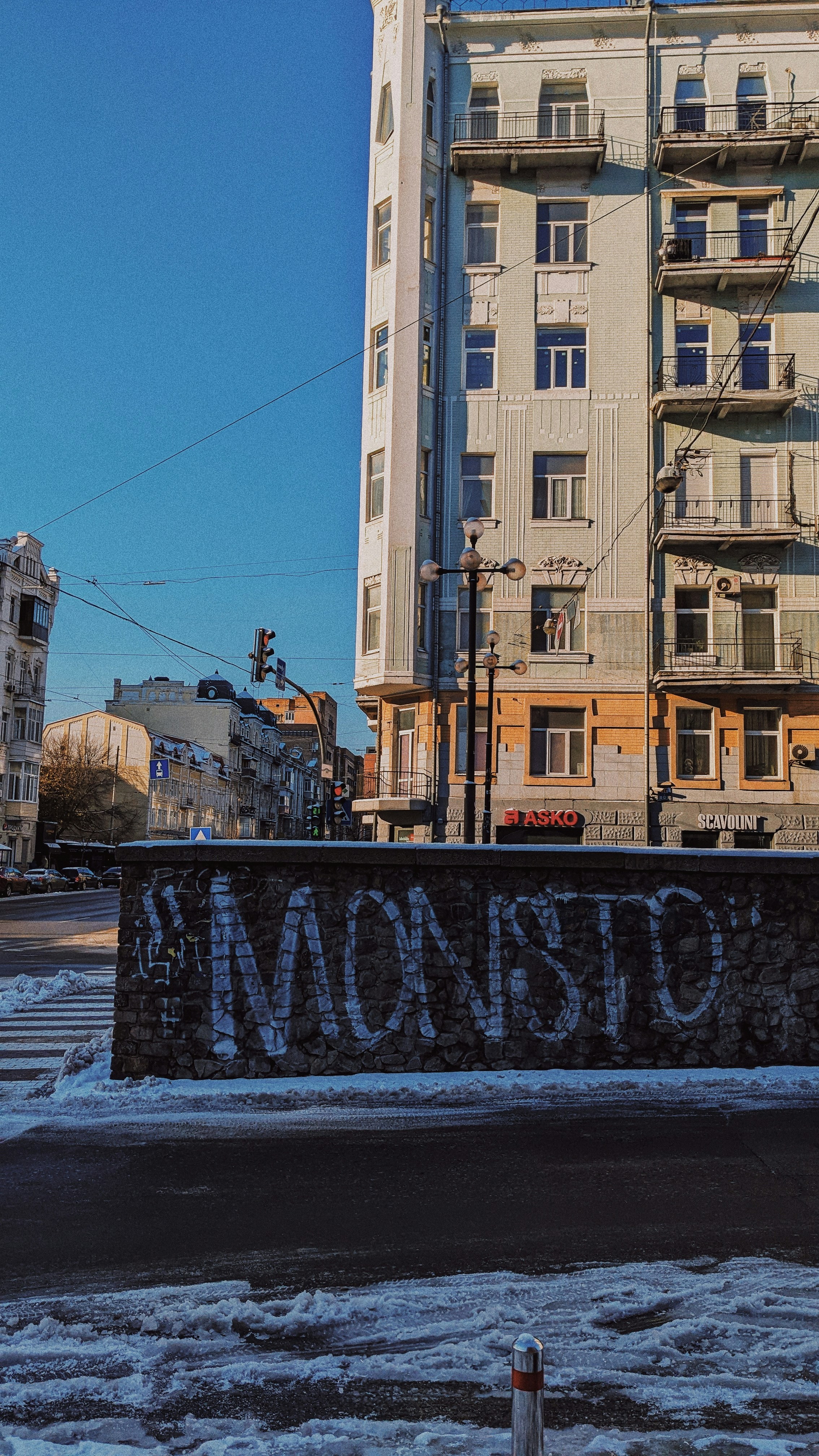 Monochrome Graffiti at the Edge of a Frosted Street