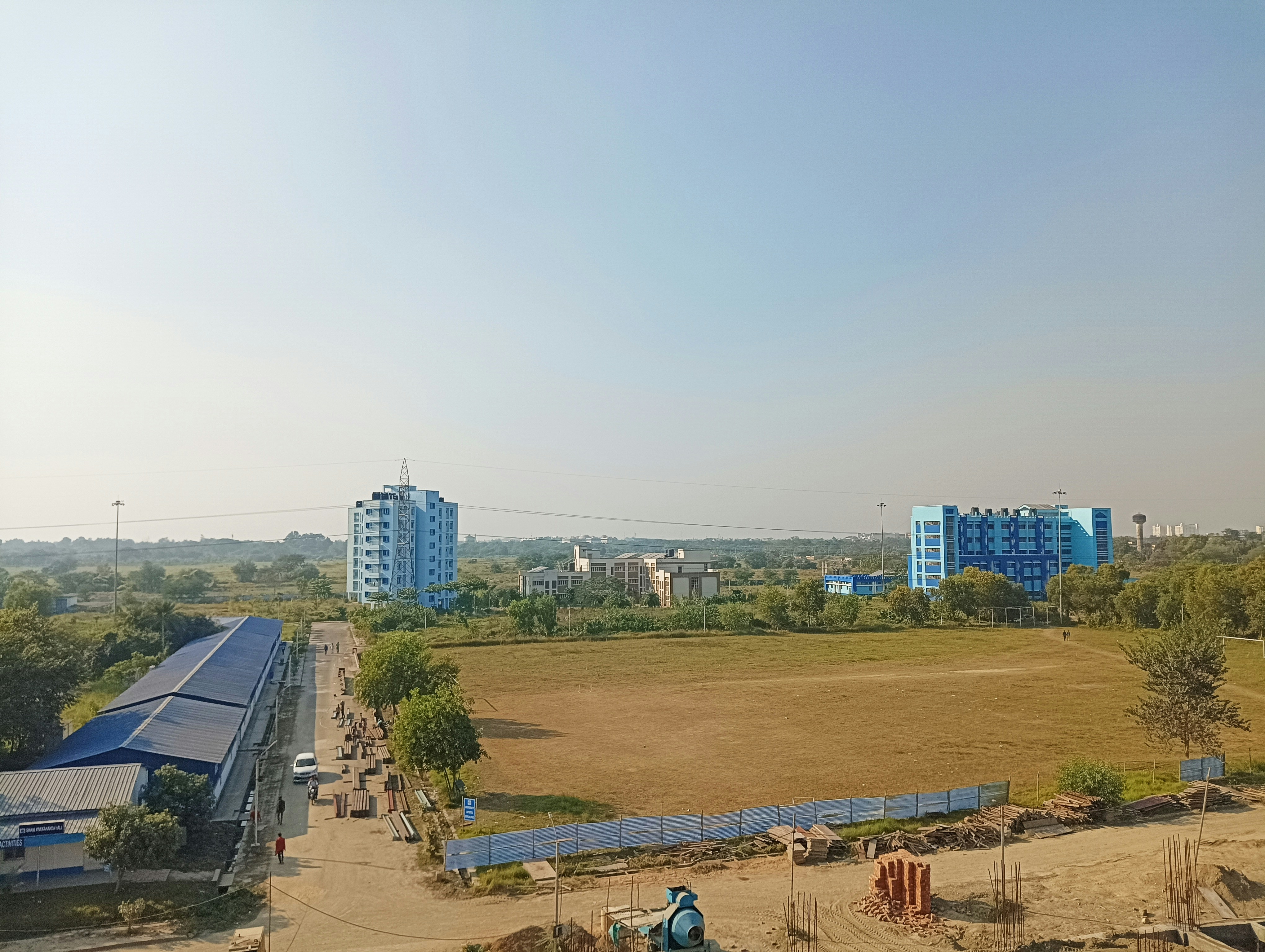 A landscape with buildings in the back photo – Free Building Image on ...