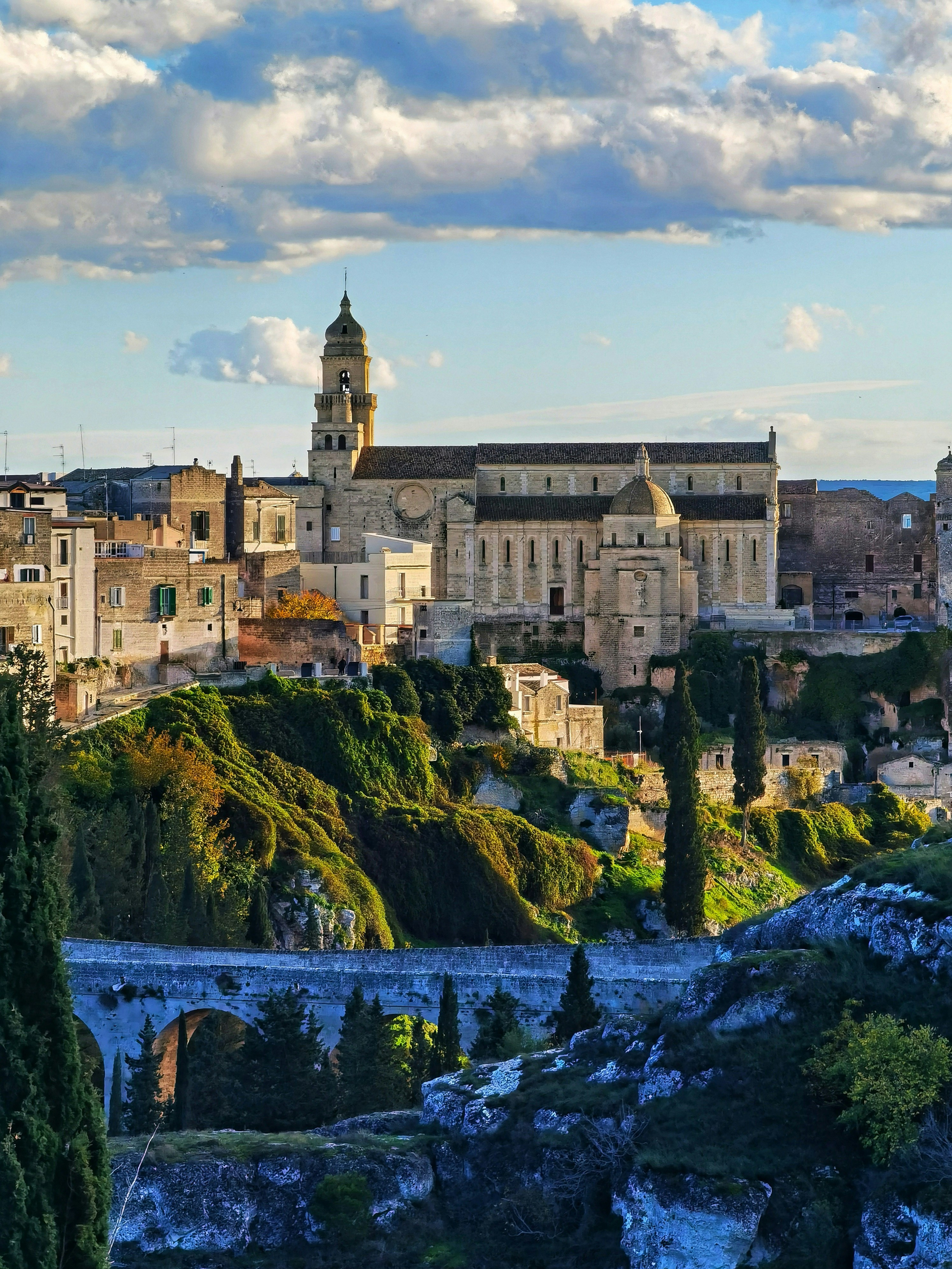 A large building with a bridge over a river photo – Free Metropolitan ...