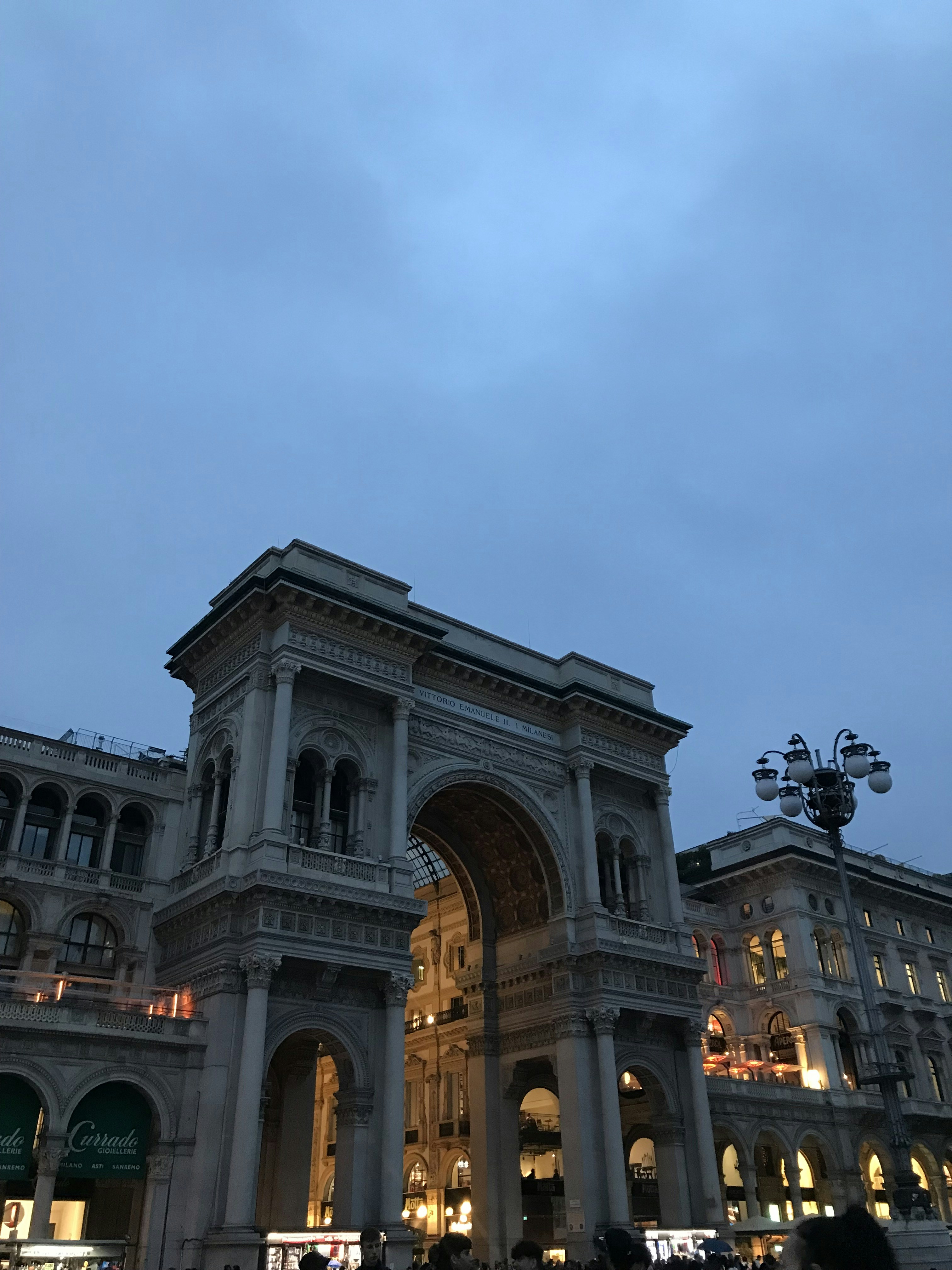 A large stone building with a large archway photo – Free Architecture ...