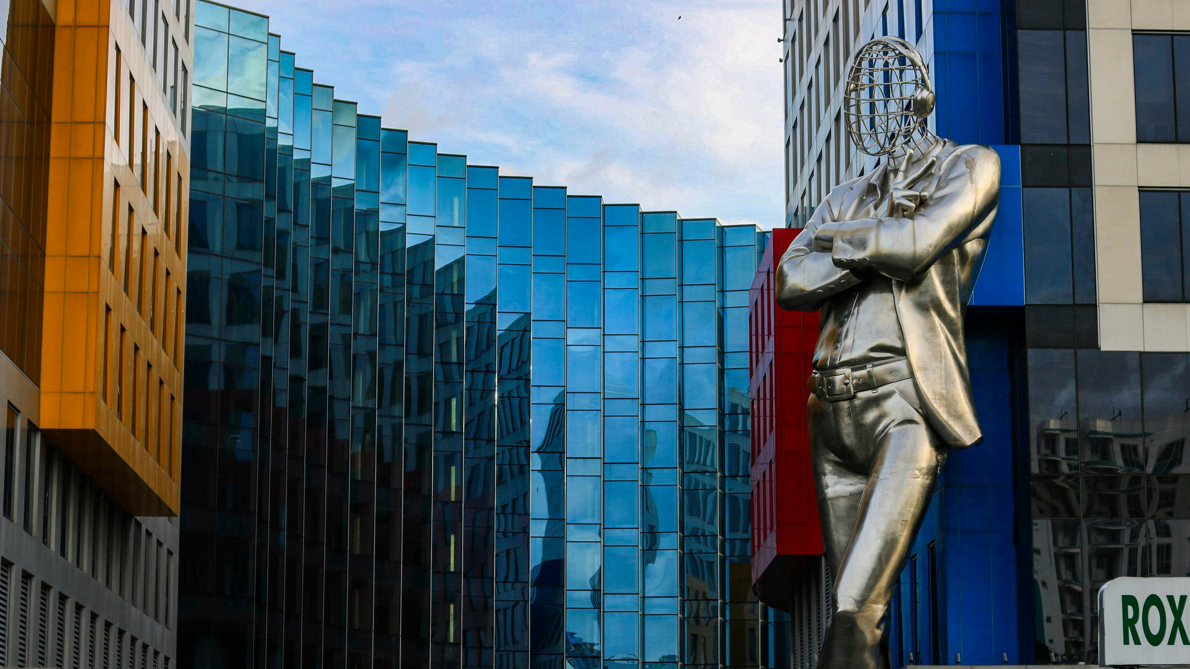 A statue of a person in front of a building photo – Free Manila Image ...