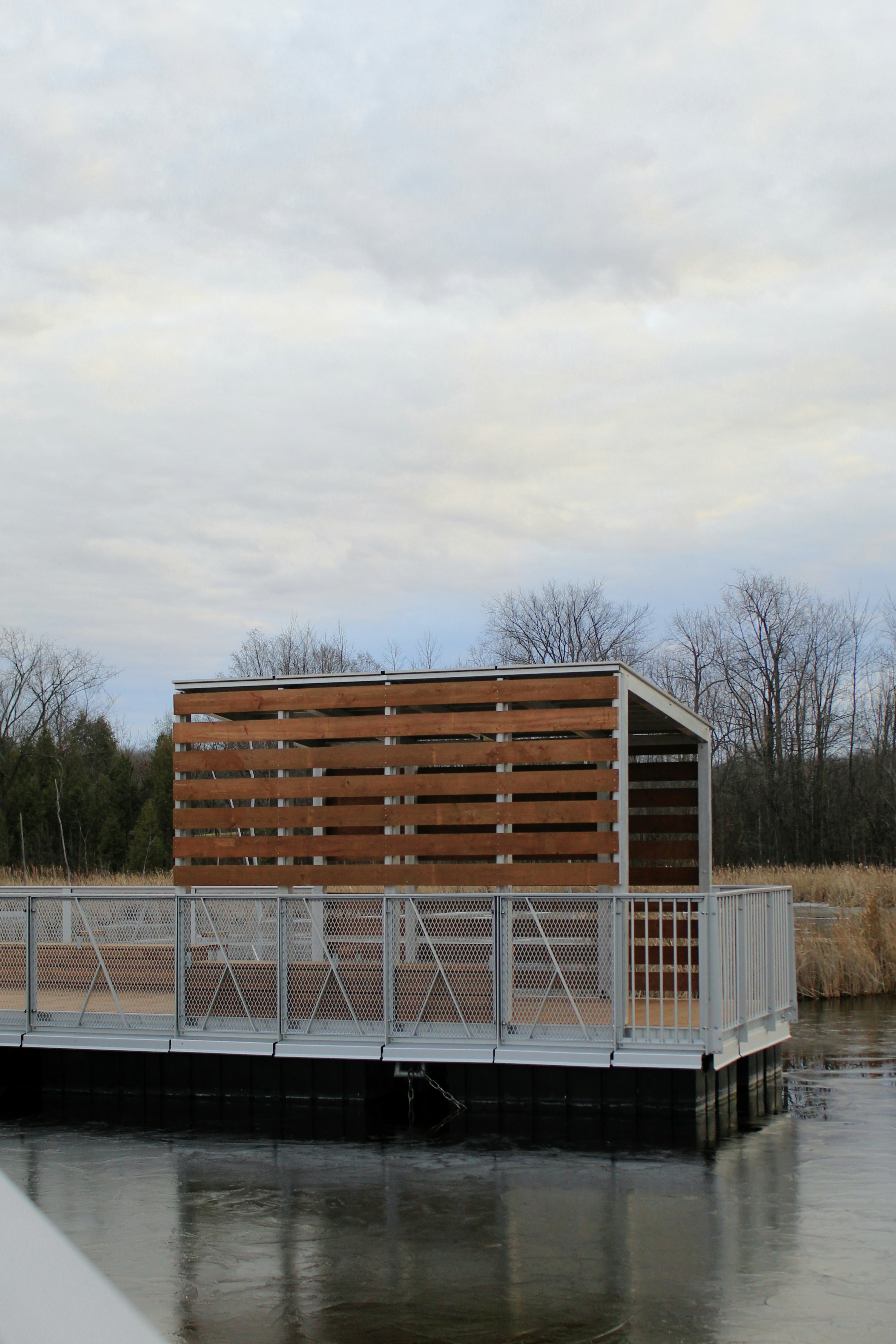 Floating Wood Shelter on a Quiet Waterway