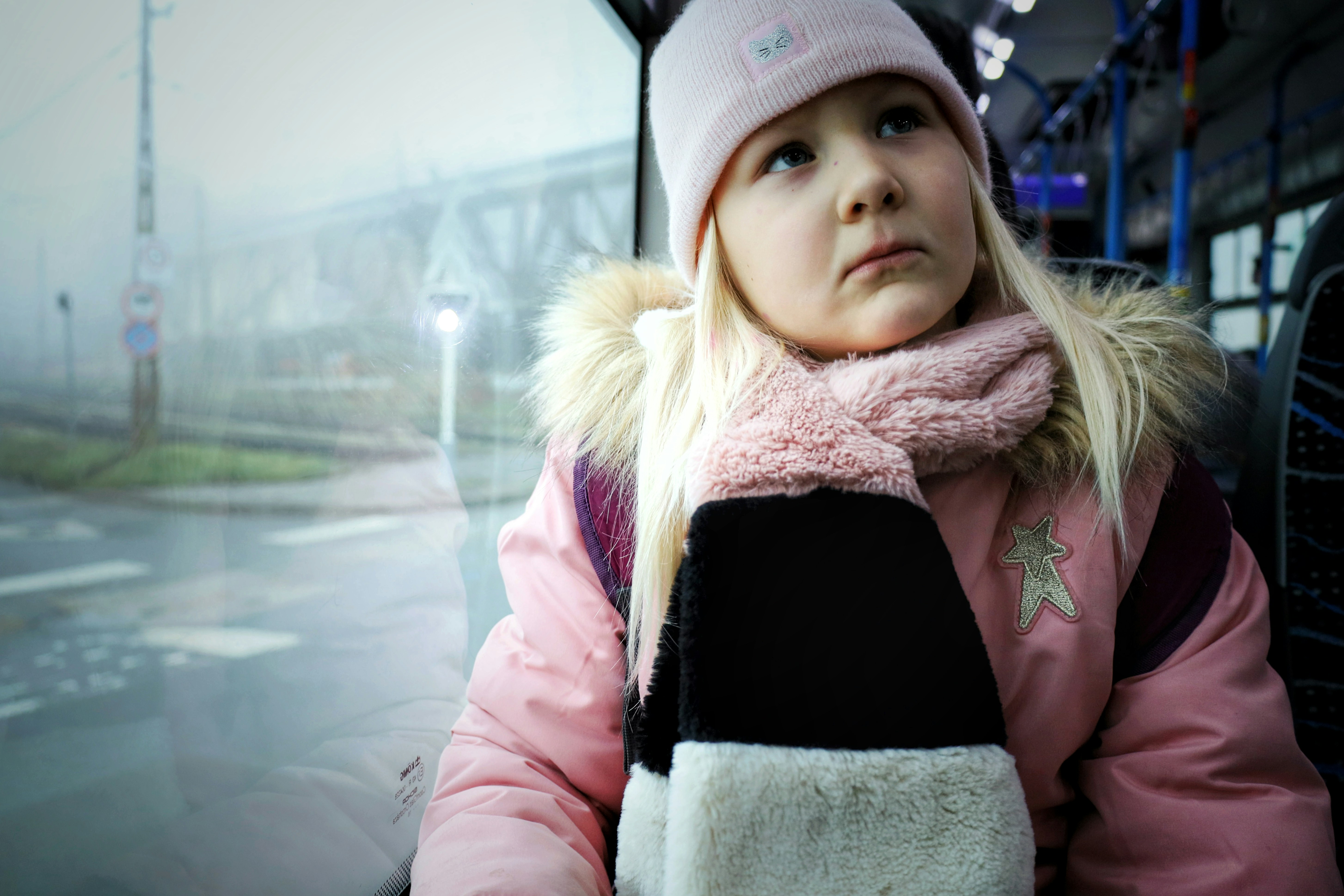 Quiet Gaze at a Frosted Bus Stop