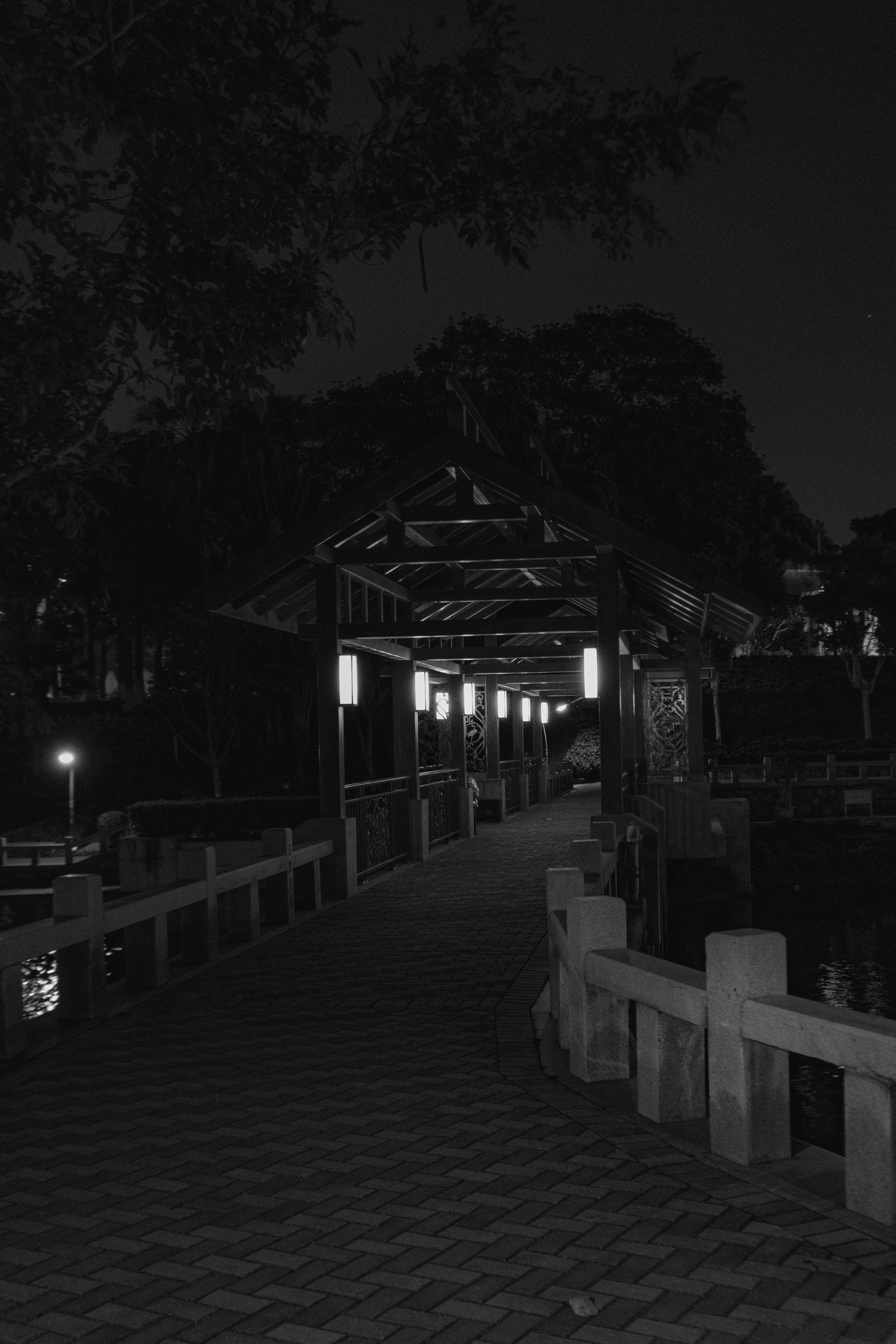 a walkway with a building in the background