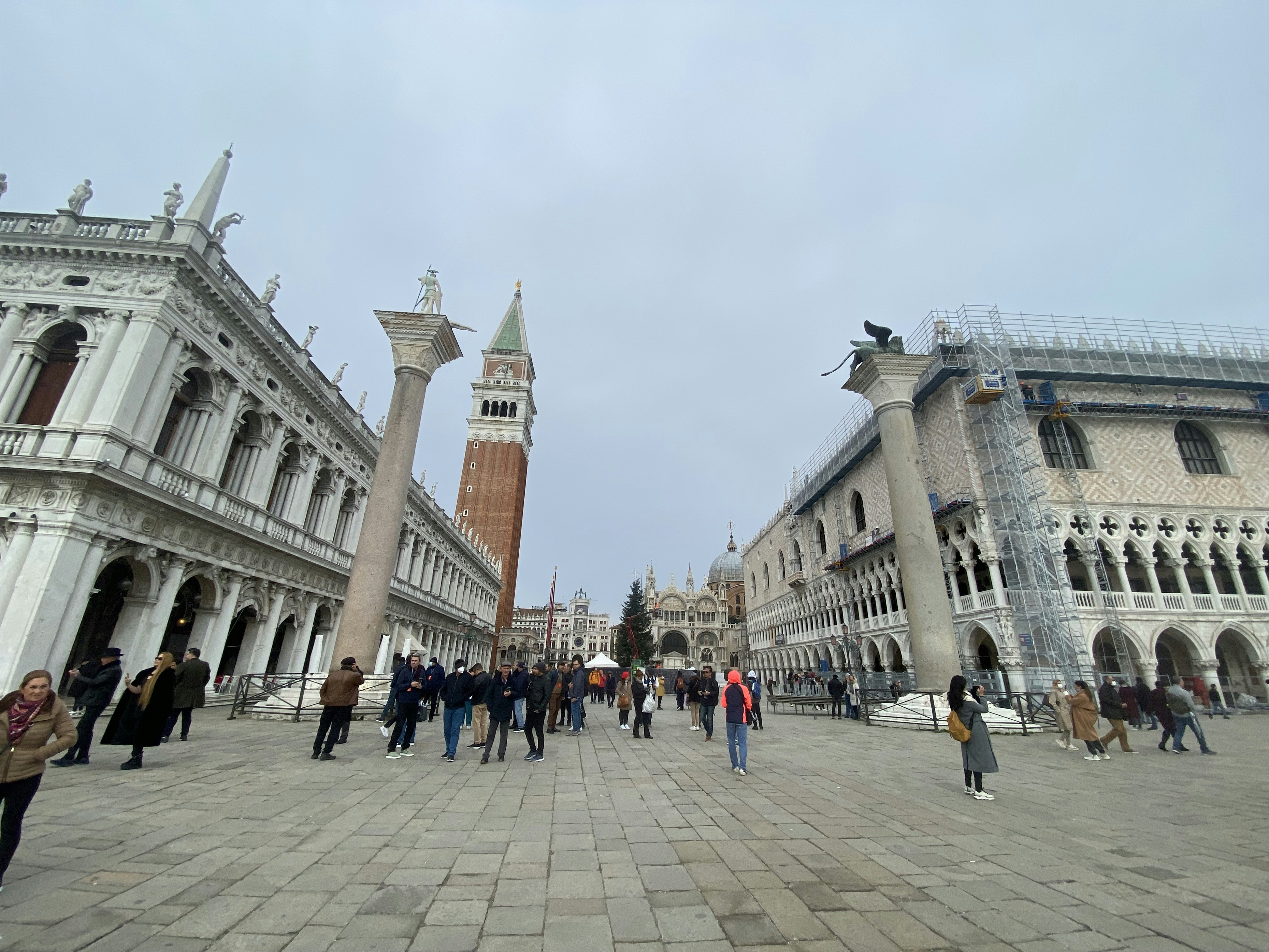 Piazza San Marco: People, Columns, and Clocktower Converge