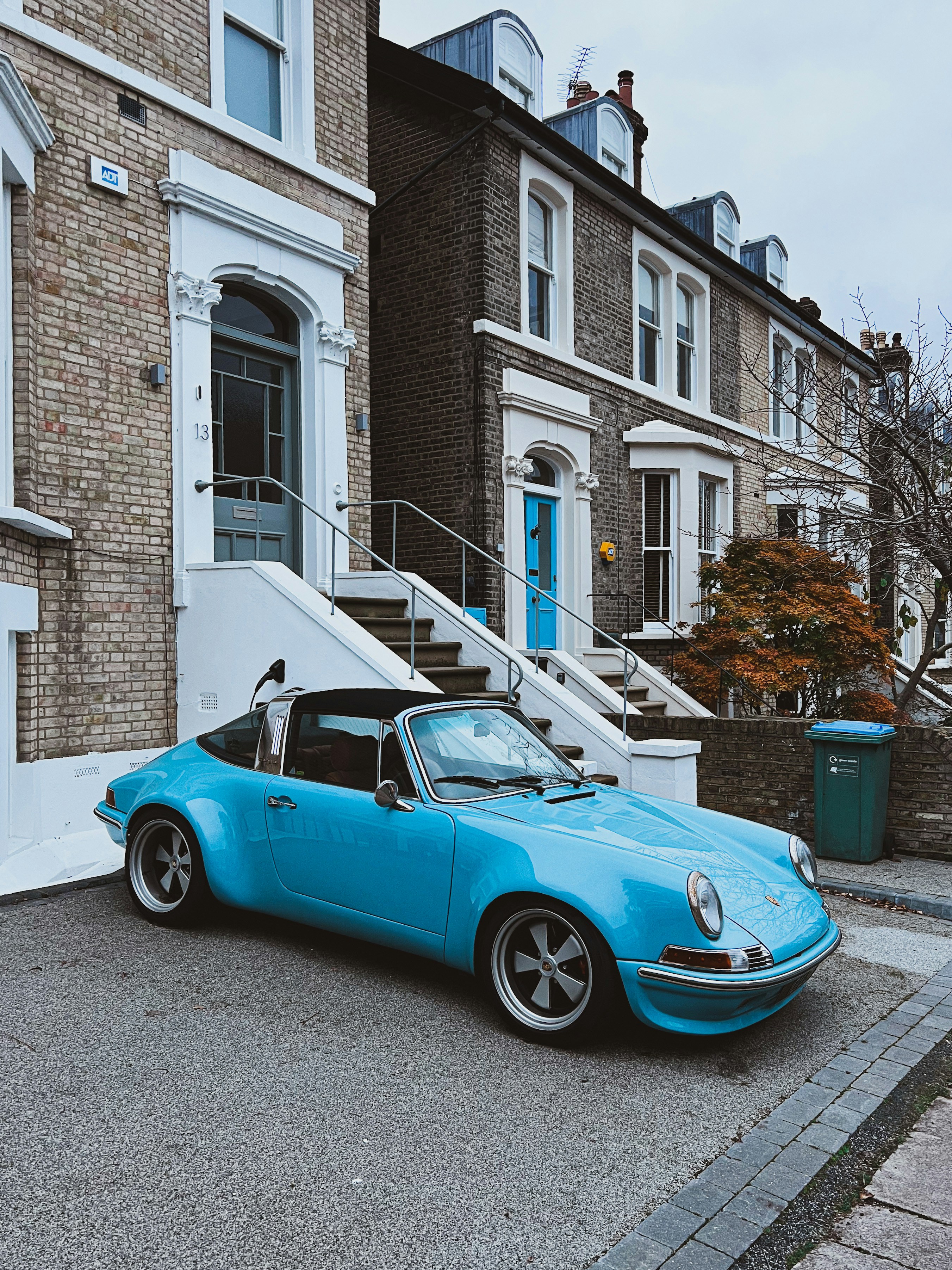 Blue Porsche in a blue neighbourhood