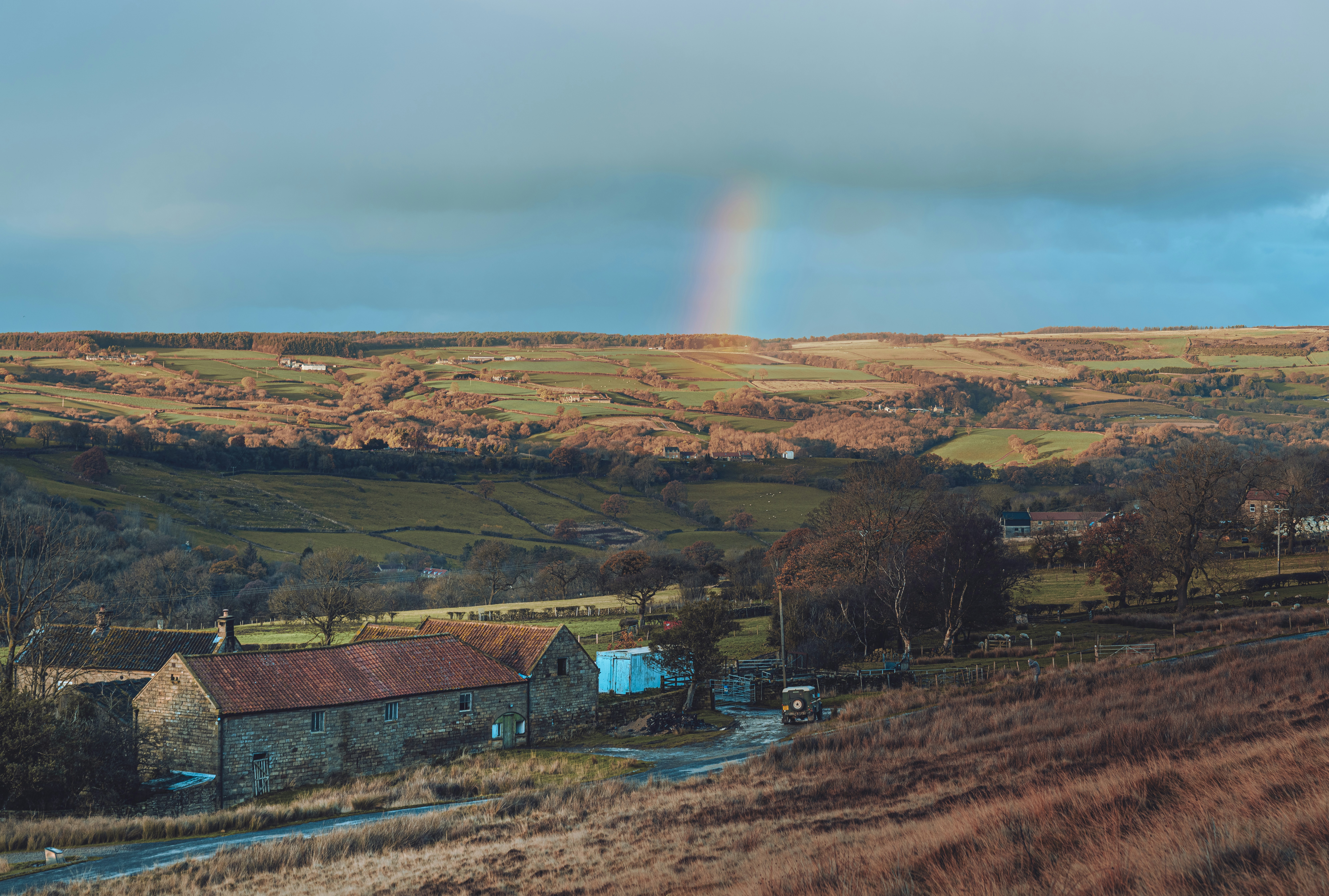Rainbow Over a Stone Village Moorland
