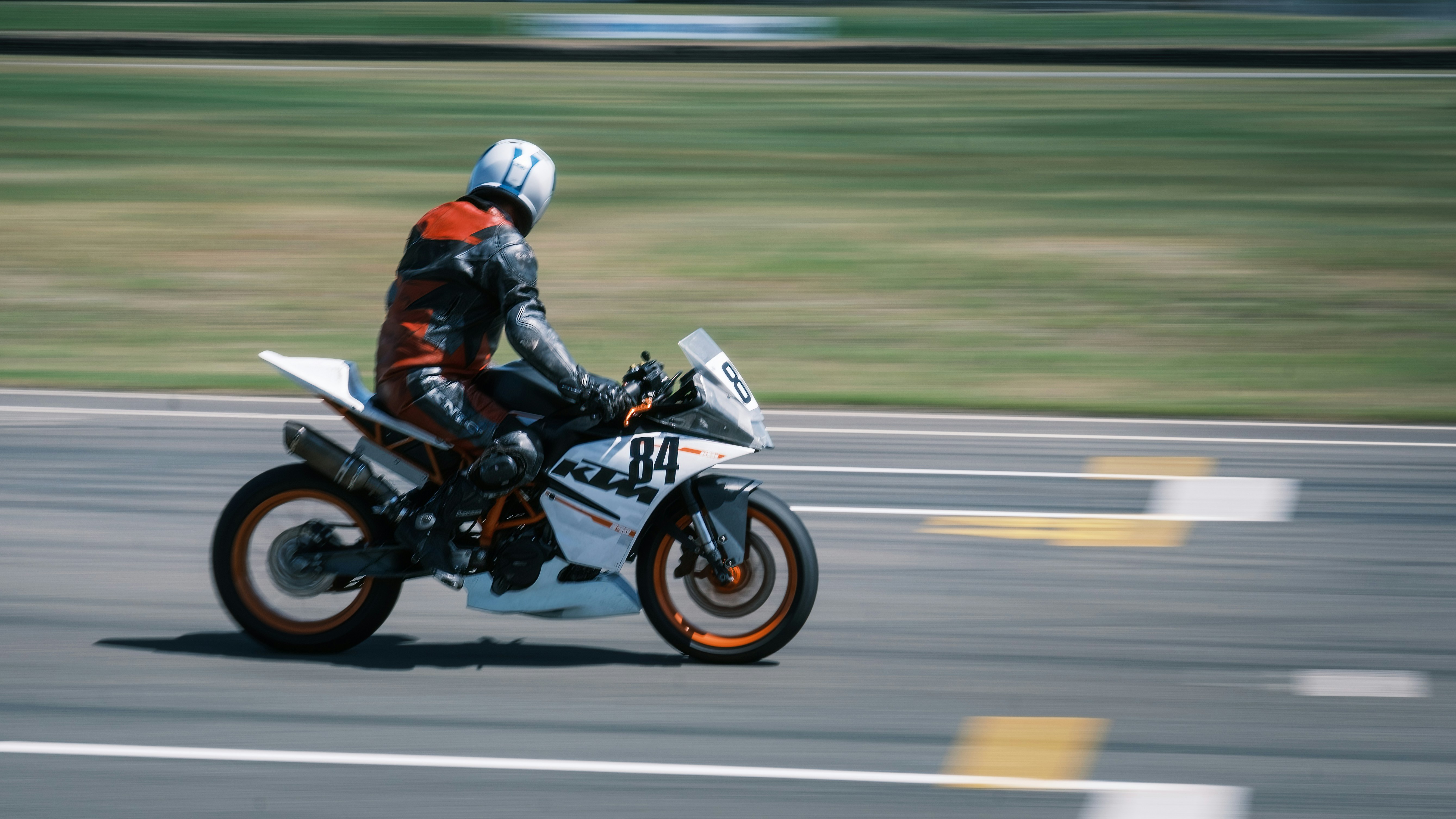 A man riding a motorcycle photo – Free Mike pero motorsport park ...