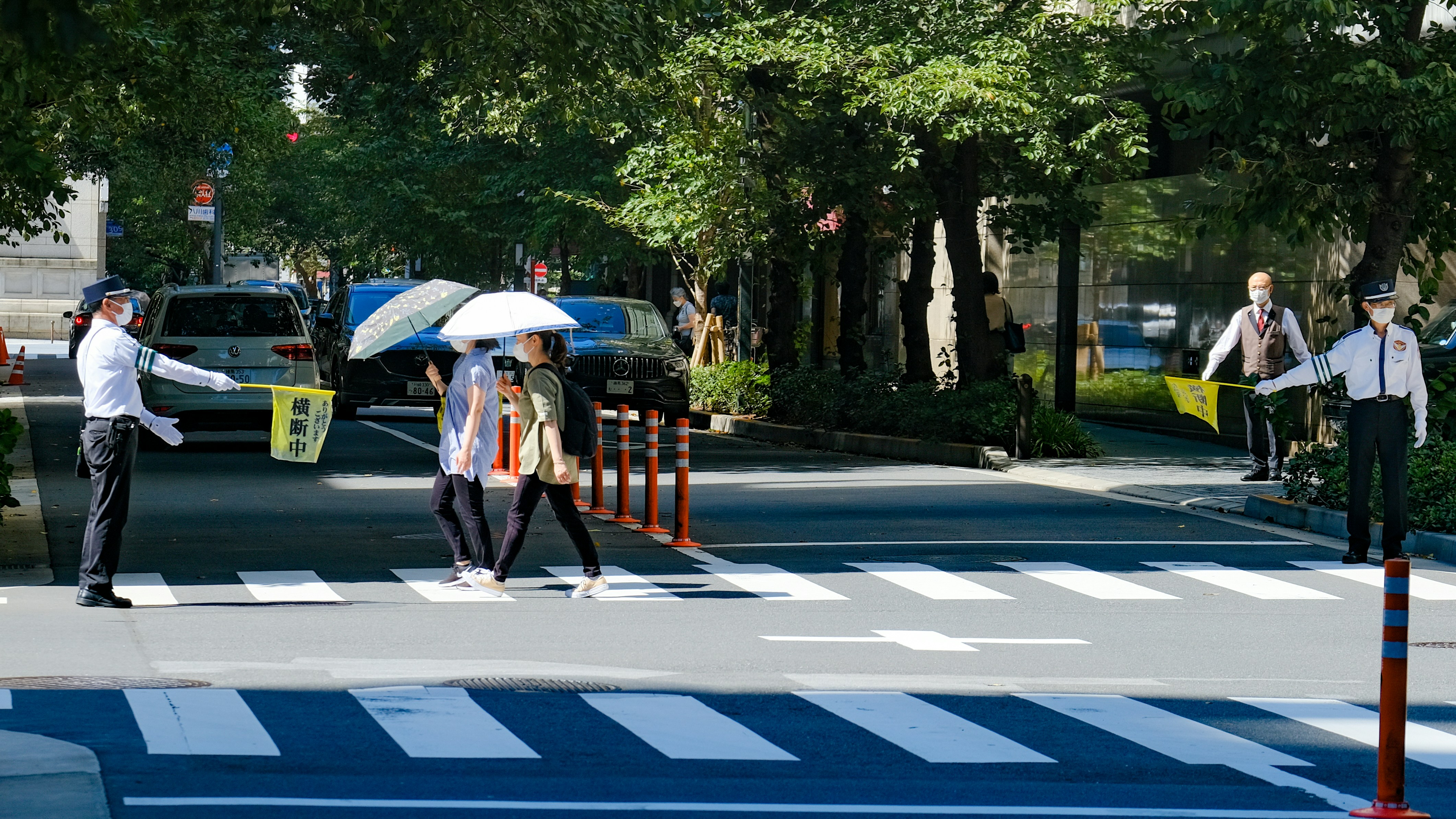 A group of people walk across a crosswalk photo – Free Nihonbashi Image ...