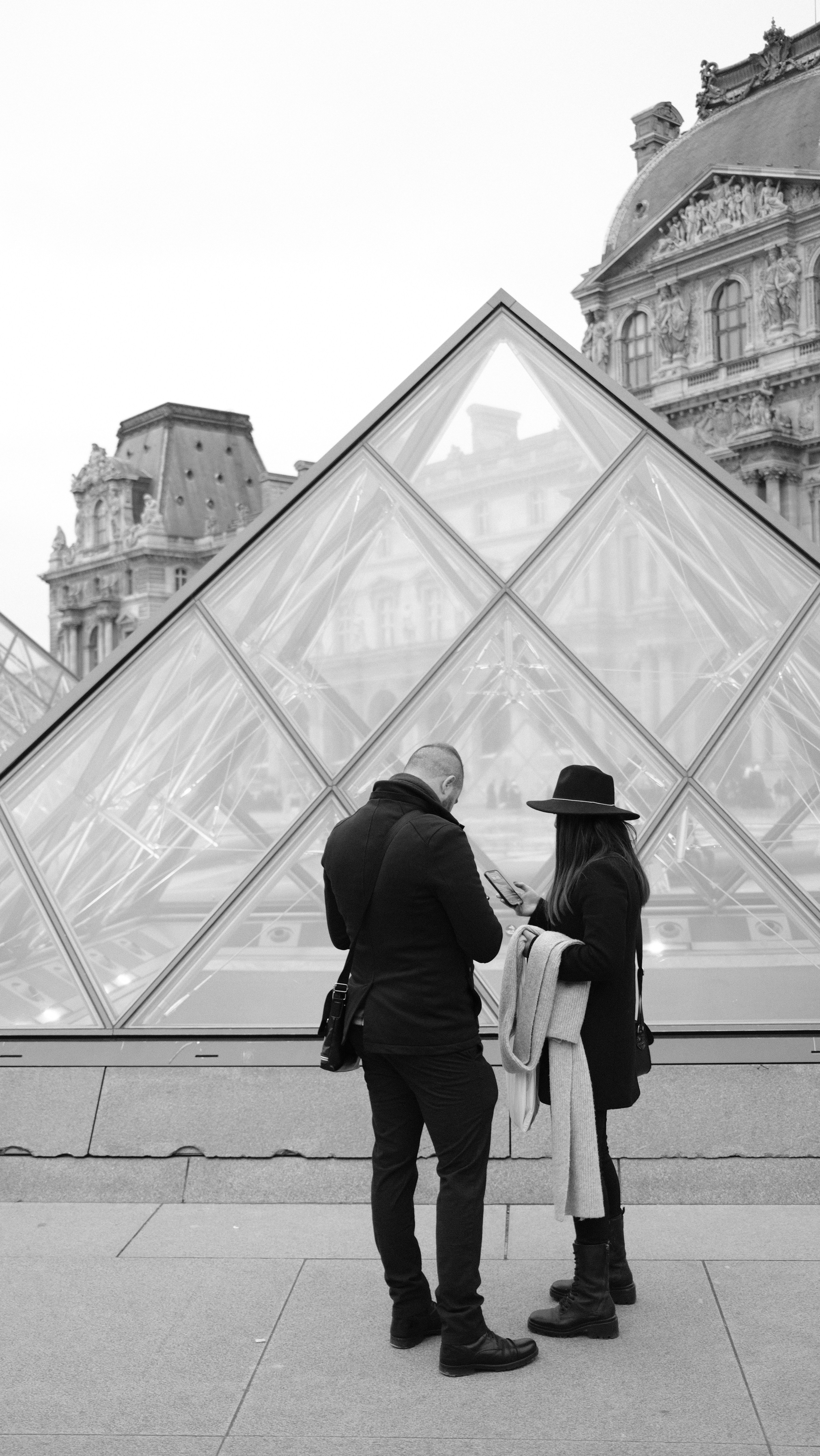 Whispers by the Louvre Pyramid: A Quiet Paris Moment