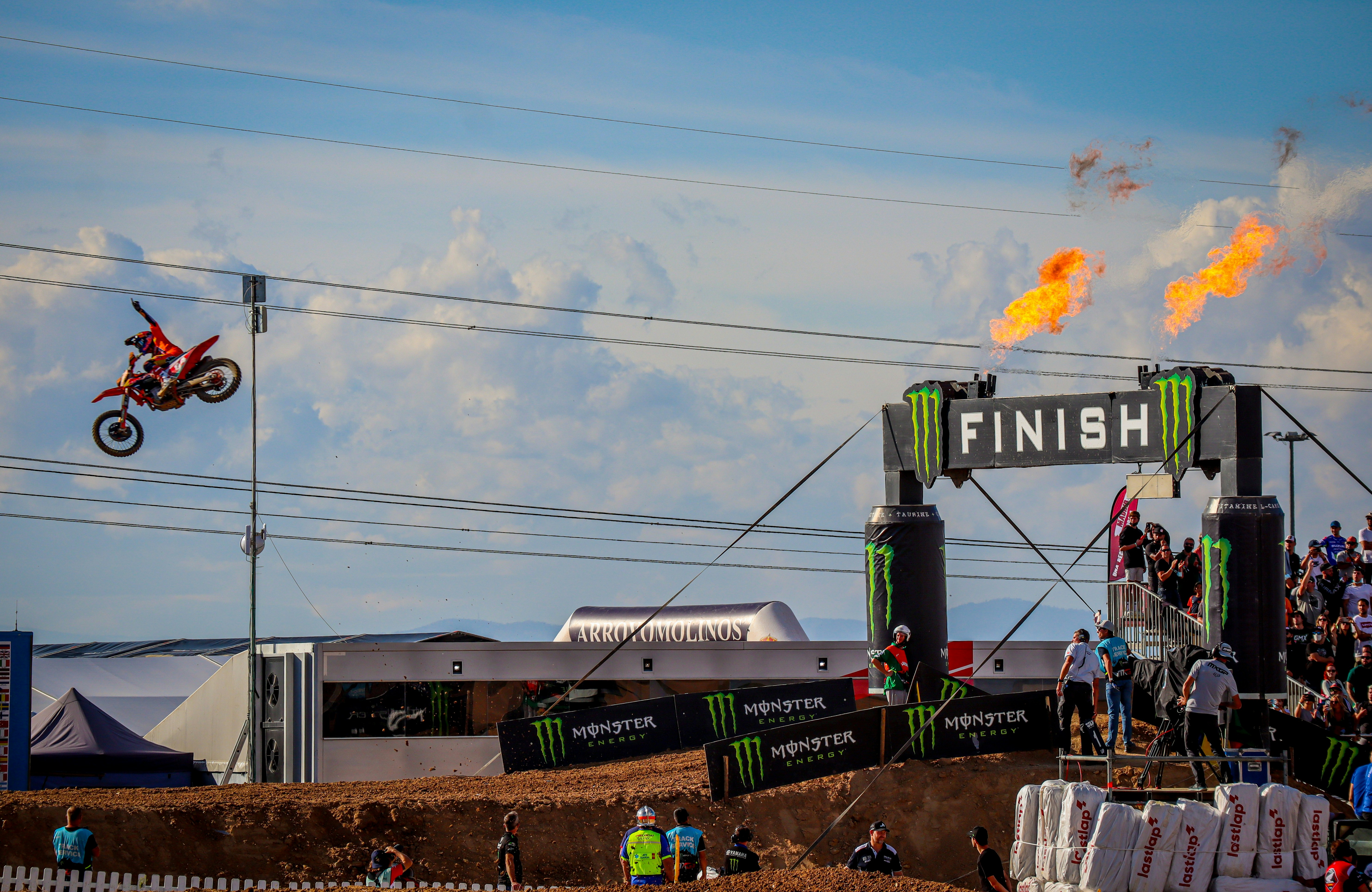 A motorcycle jumping over a ramp photo – Free Motocross Image on Unsplash