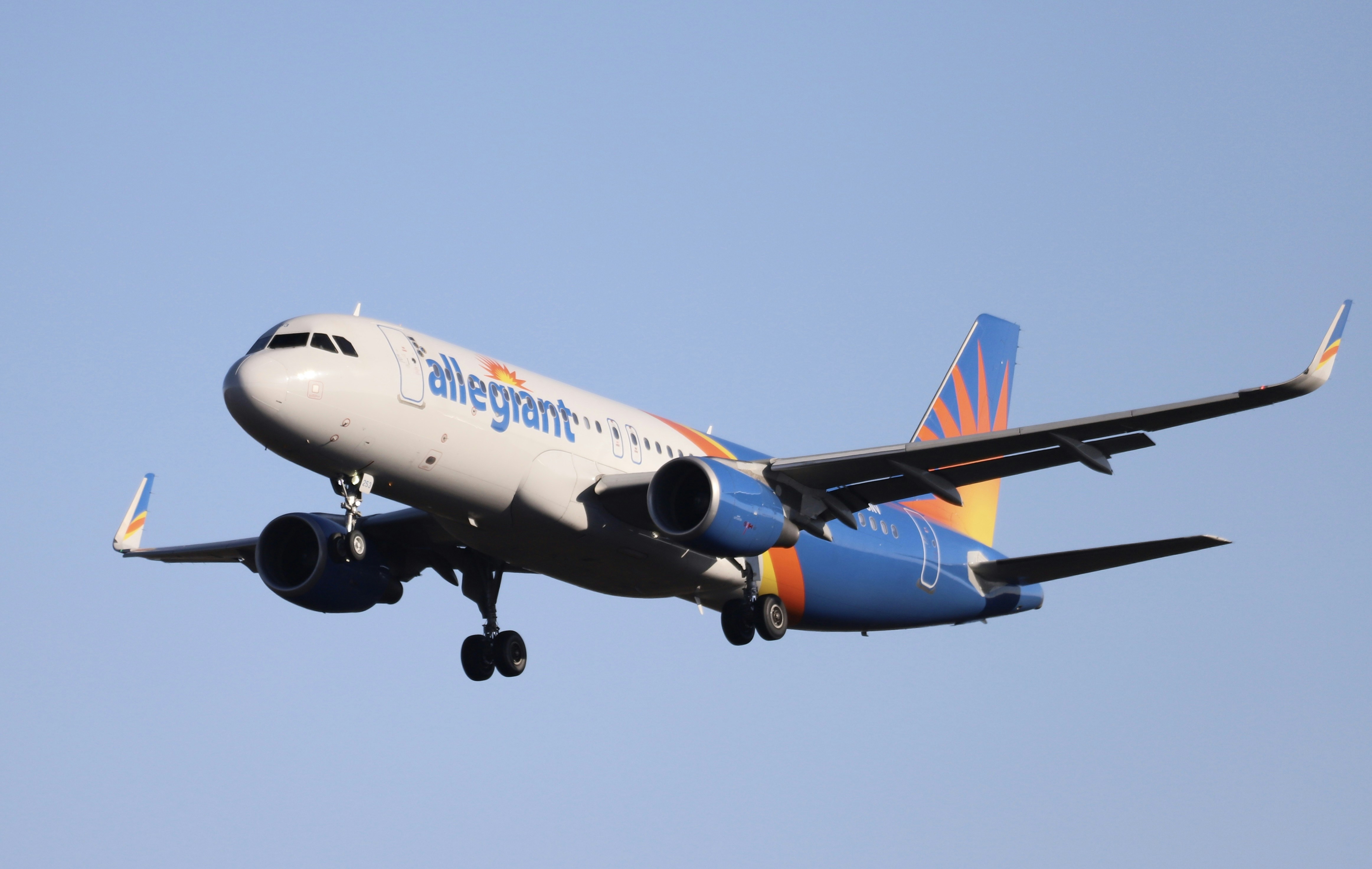 A large airplane flying in the sky photo – Free Aircraft Image on Unsplash