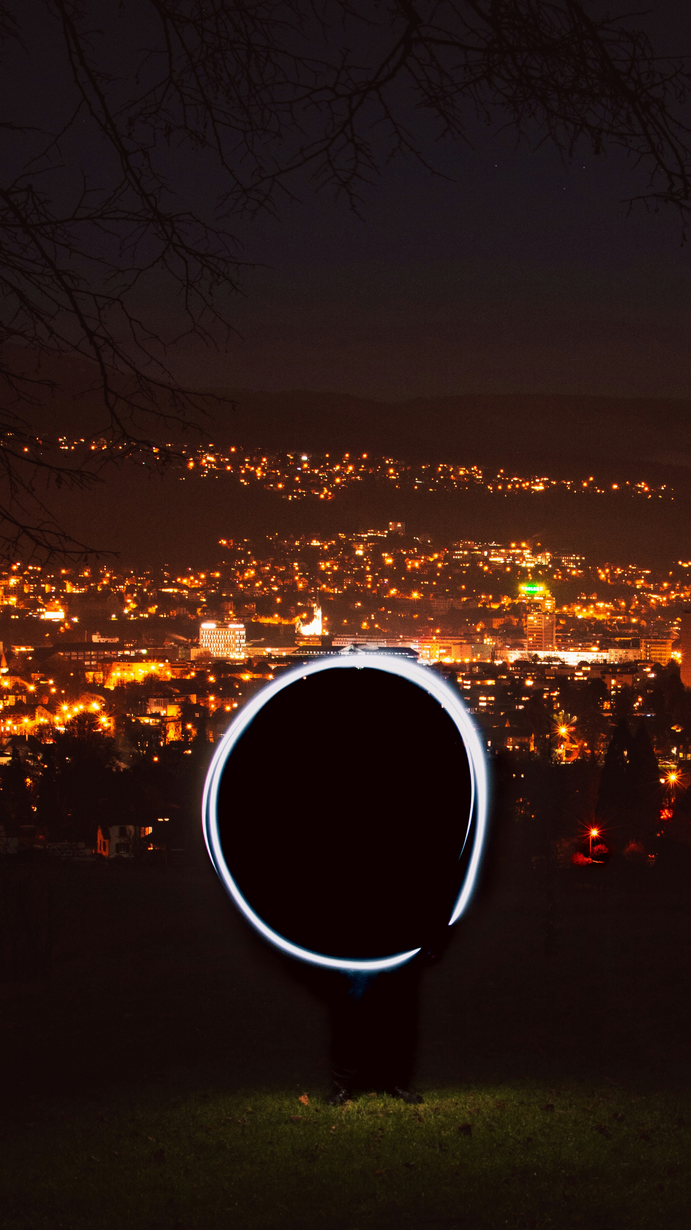 Halo Ring Over the City: A Night-Painted Circle Illuminating the Skyline