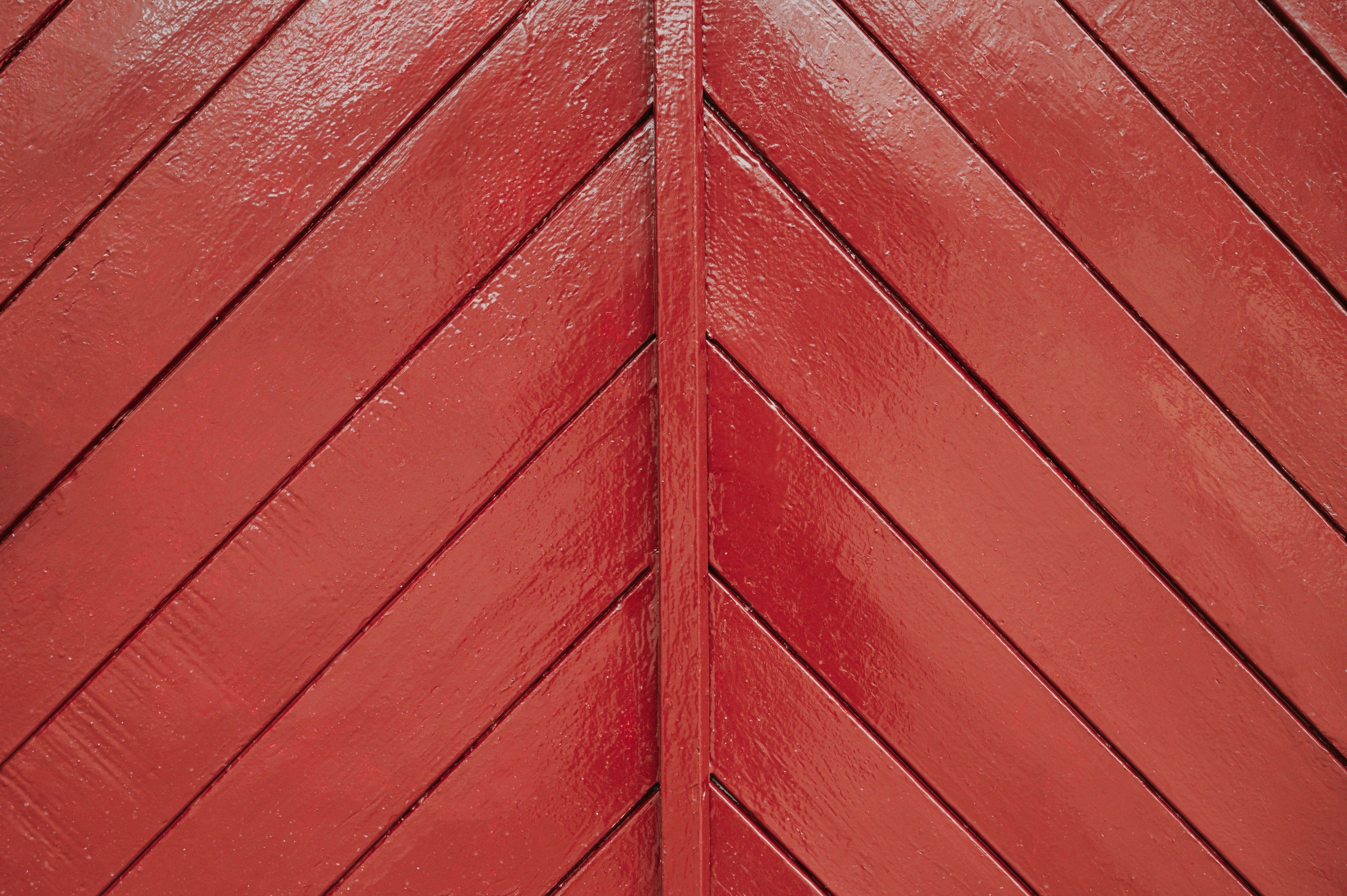 Crimson Chevron Convergence: Center-Line Symmetry in a Painted Wood Panel
