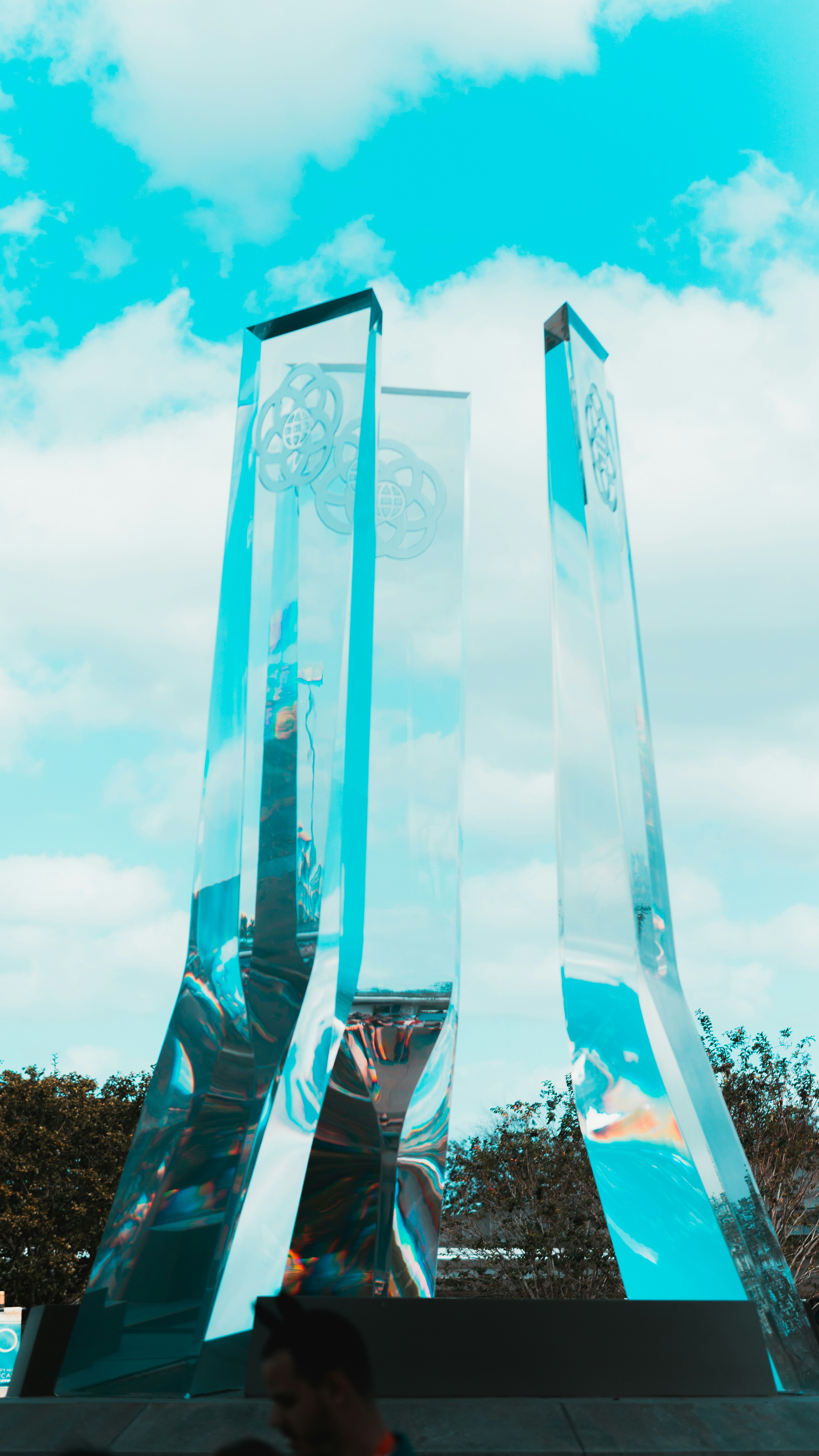 Azure Monoliths: Glass Sculptures Reach Toward a Sky of Turquoise