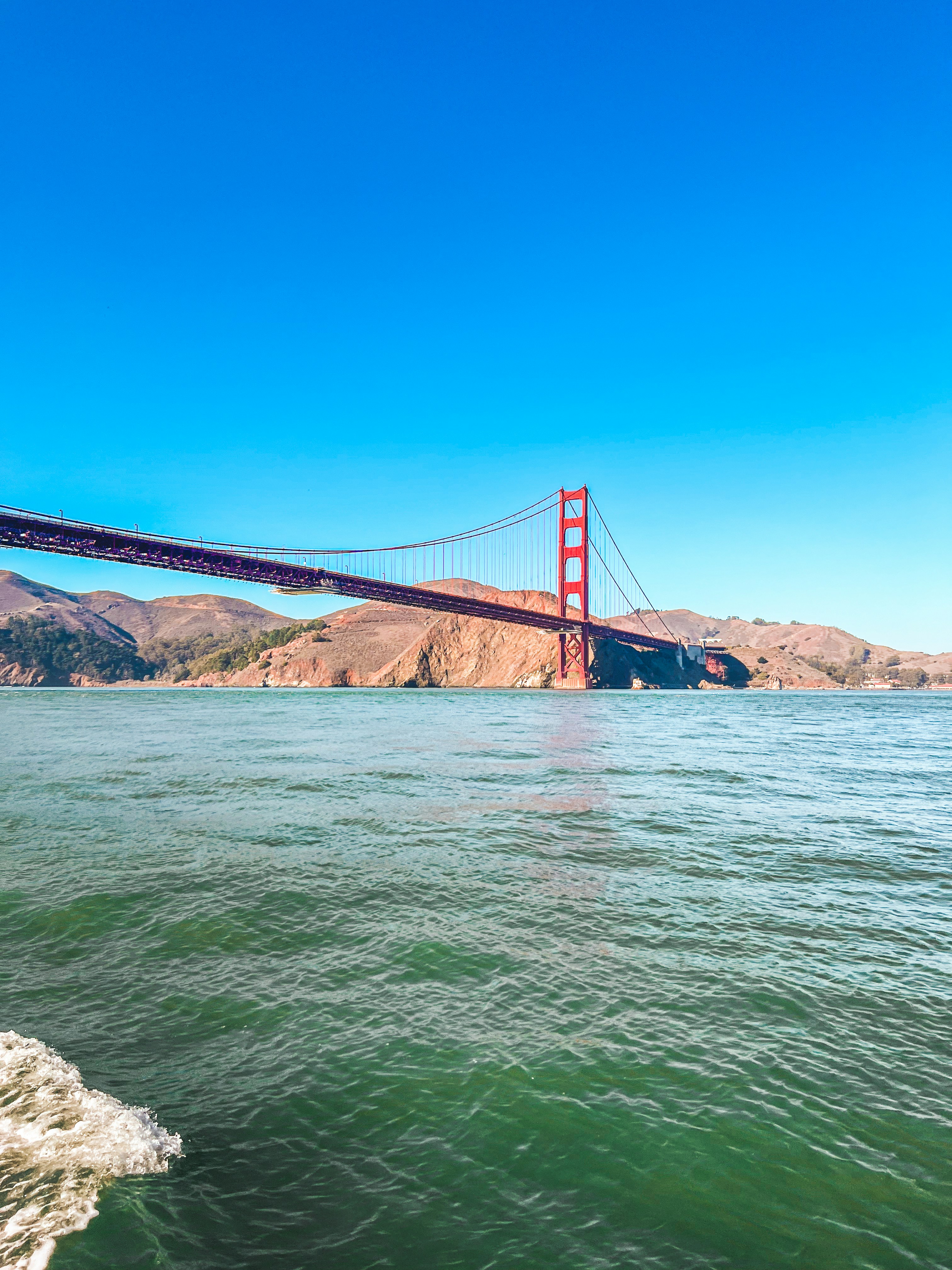 A red bridge over water photo – Free San francisco Image on Unsplash