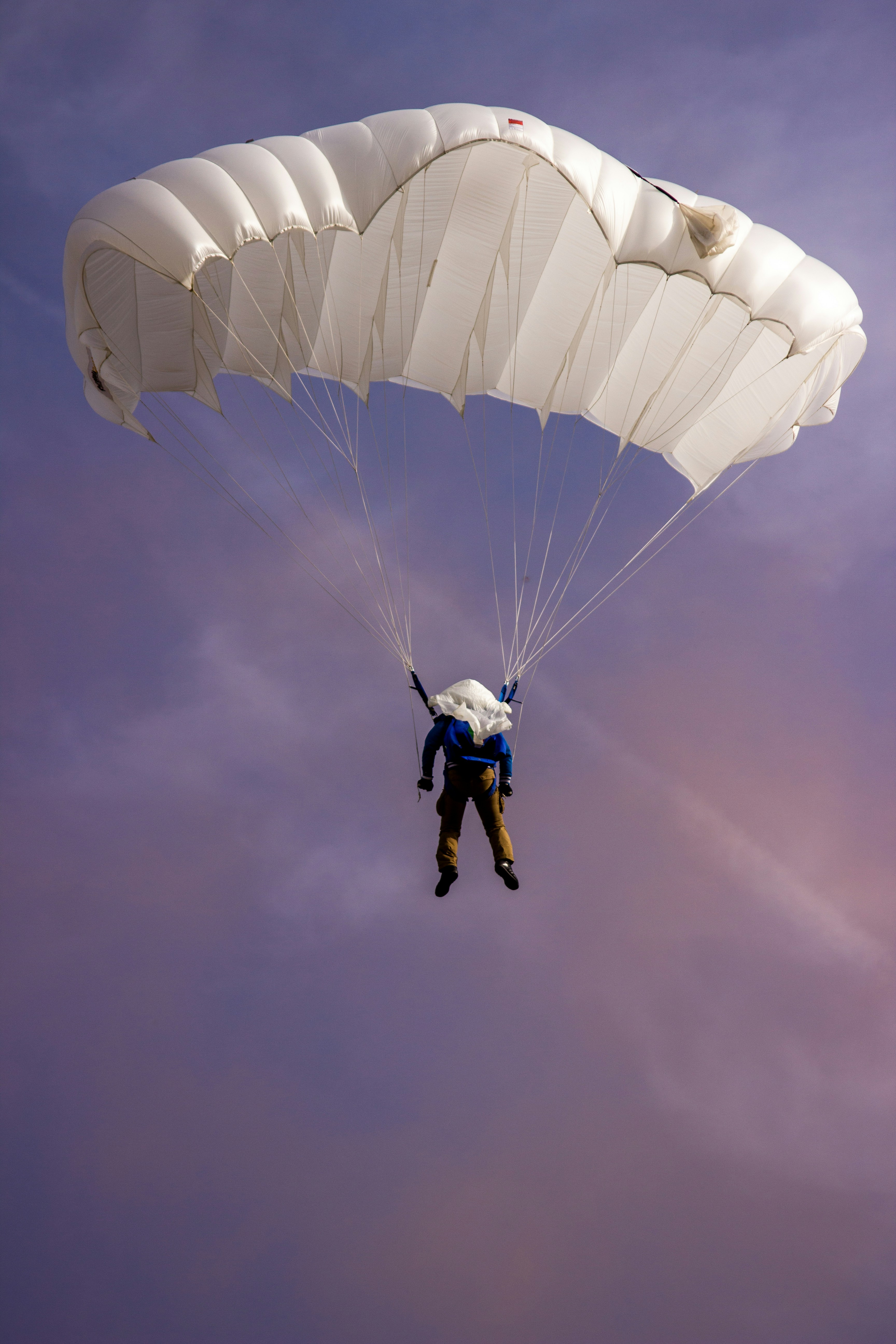 A person parachuting in the air photo – Free Baby Image on Unsplash