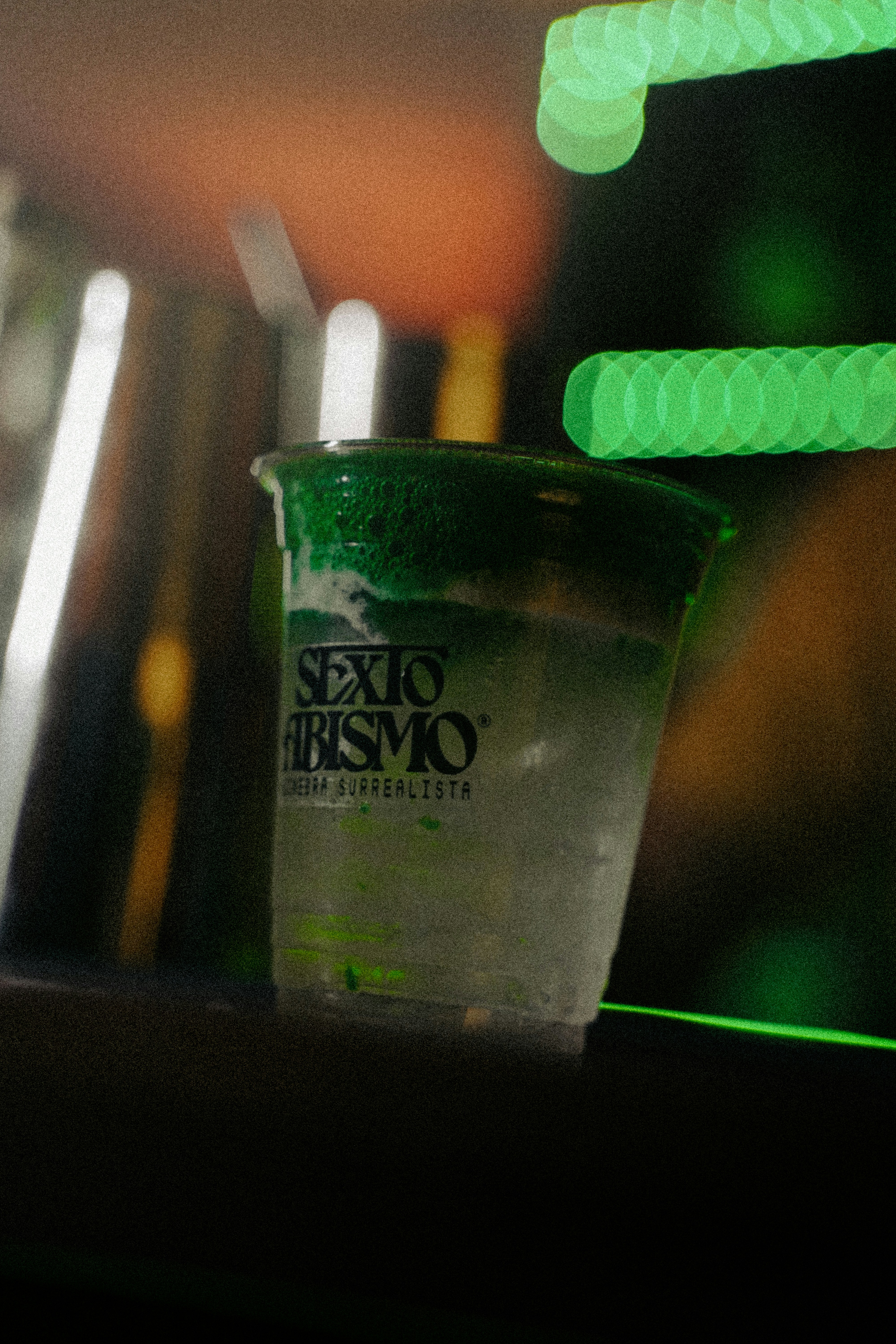 Neon Green Glow Over a Frozen Sip
