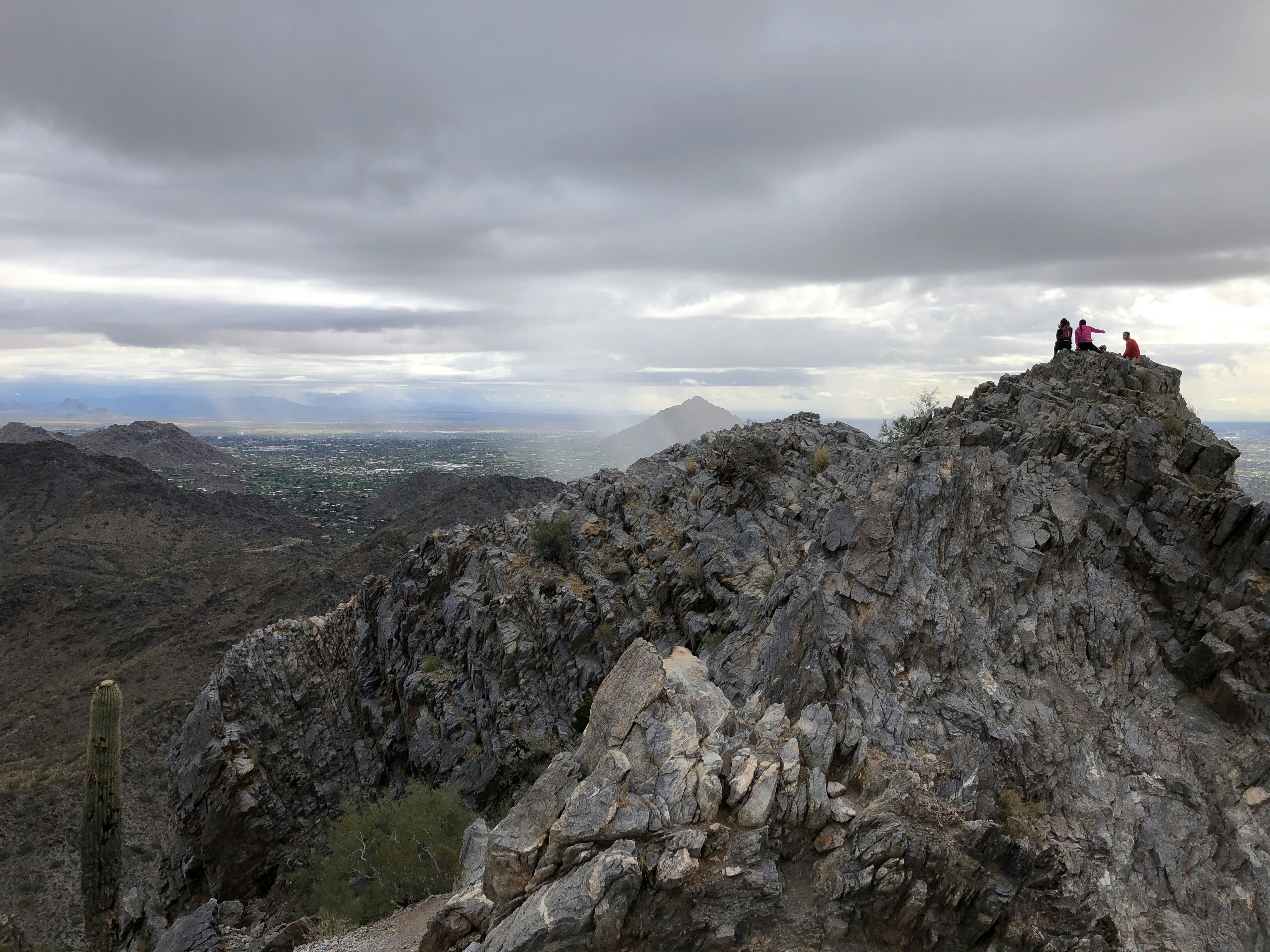 Granite Ridge Summit: Figures at the Edge of Stone and Sky