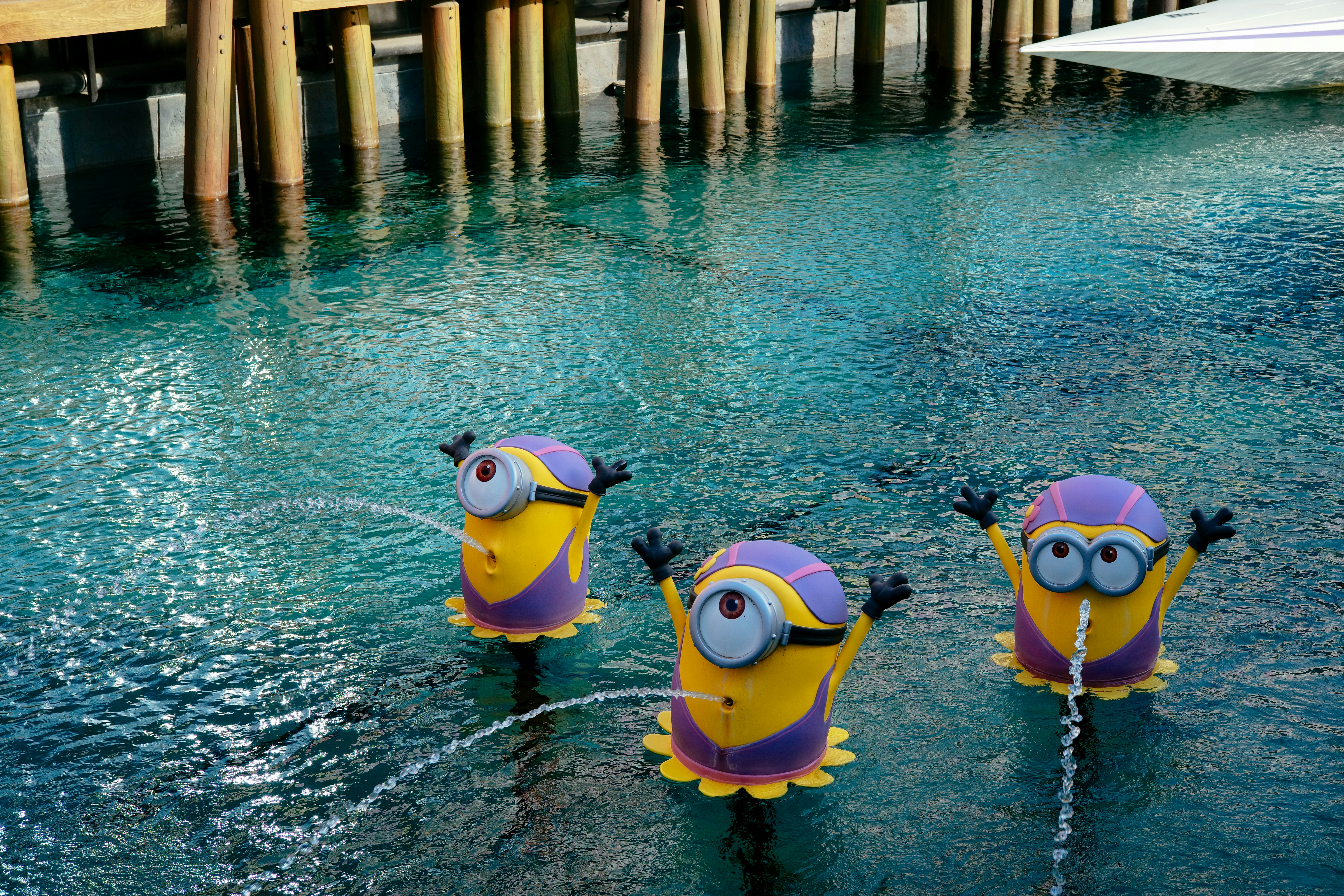 A group of colorful objects in the water photo – Free Water Image on ...