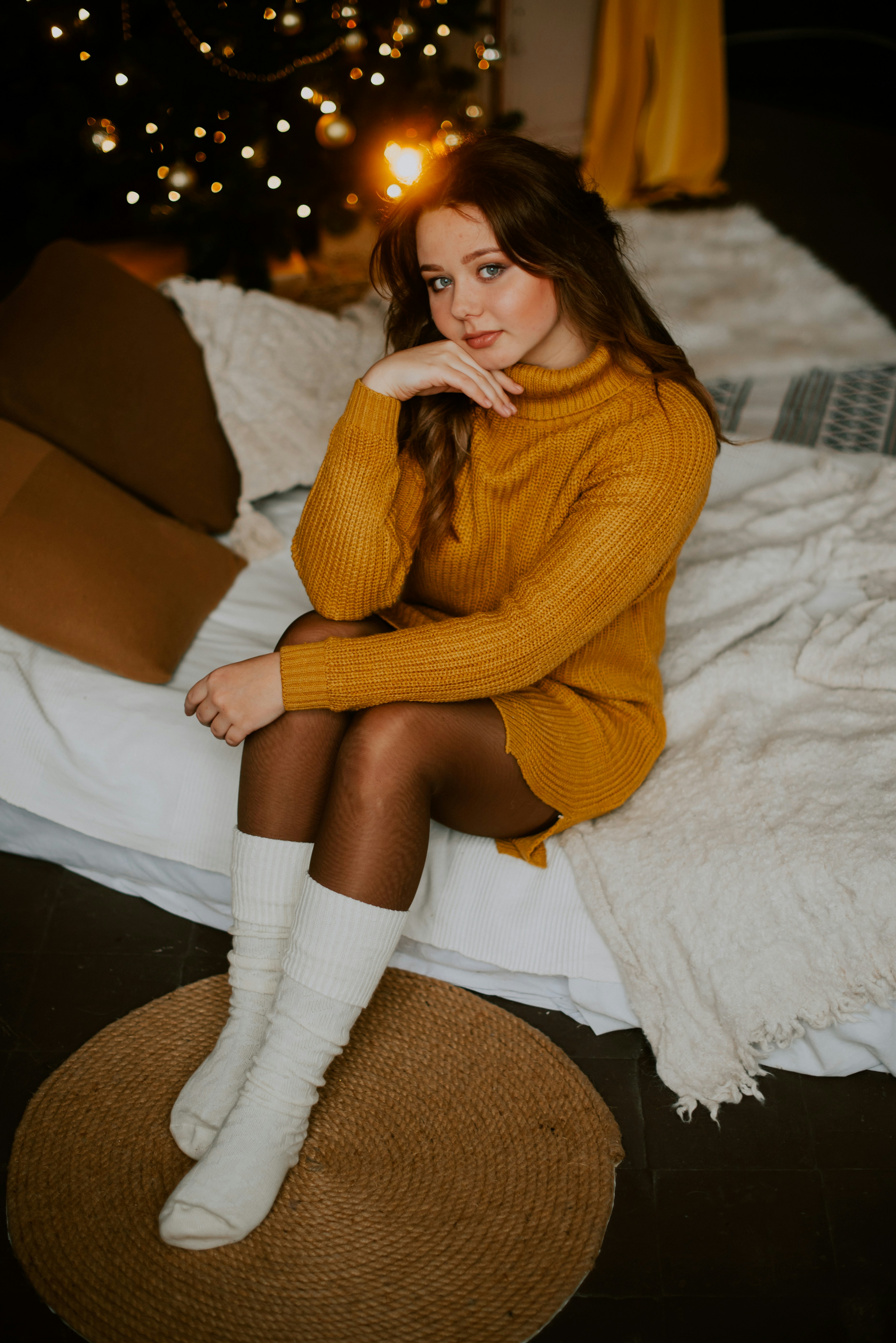 a woman sitting on a couch