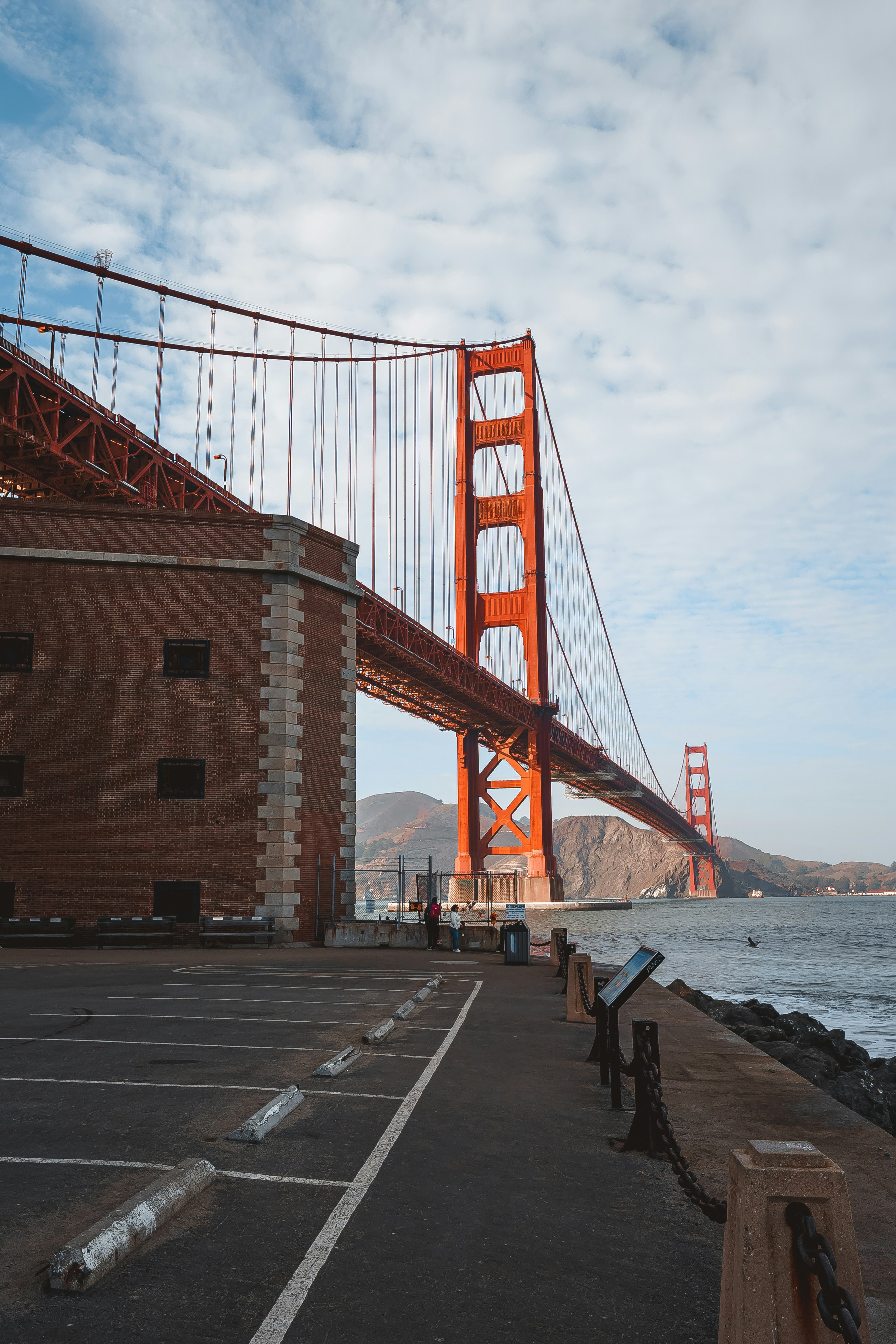 A large red bridge over water photo – Free San francisco Image on Unsplash