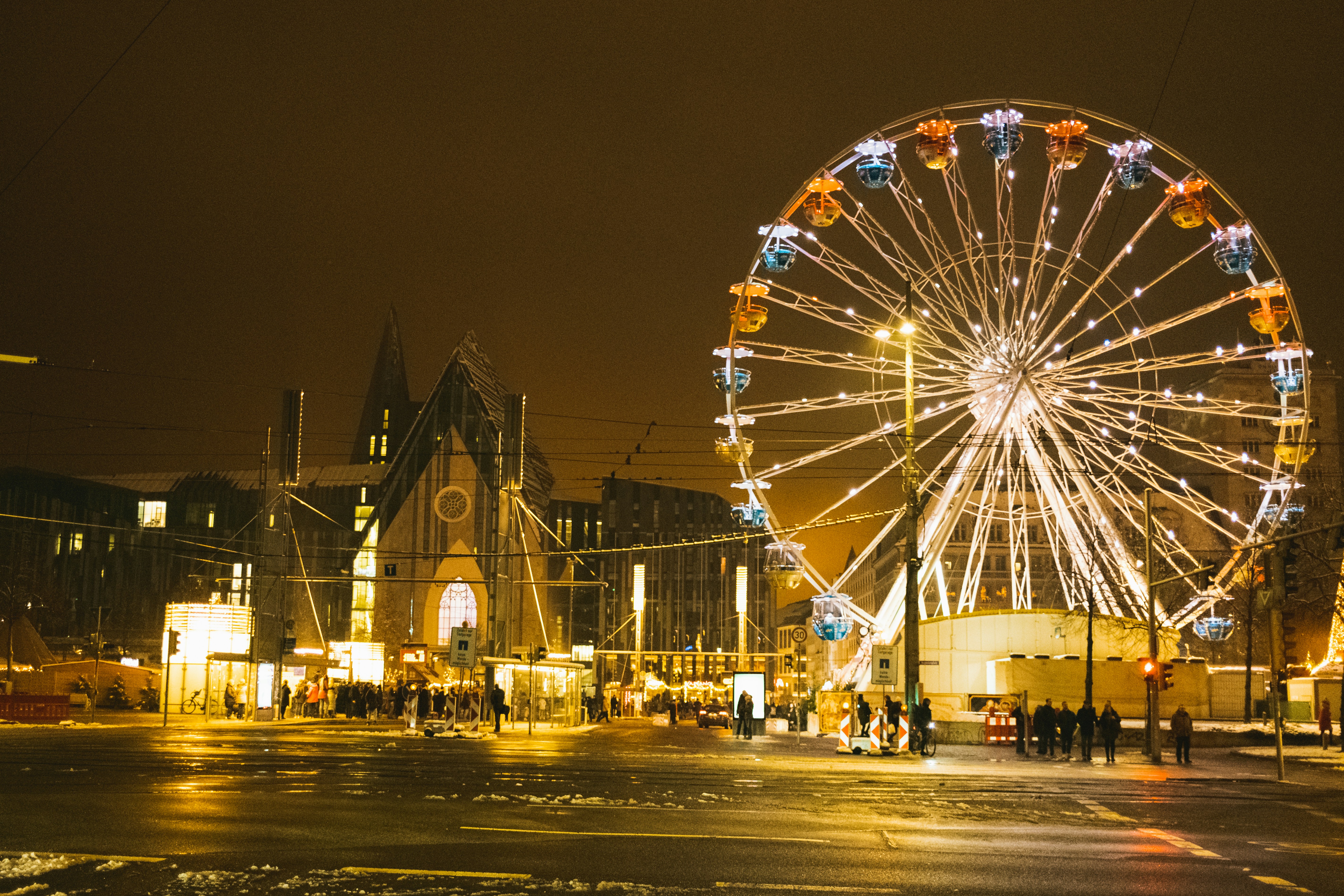 Night Wheel: Carnival Lights Over a City Square