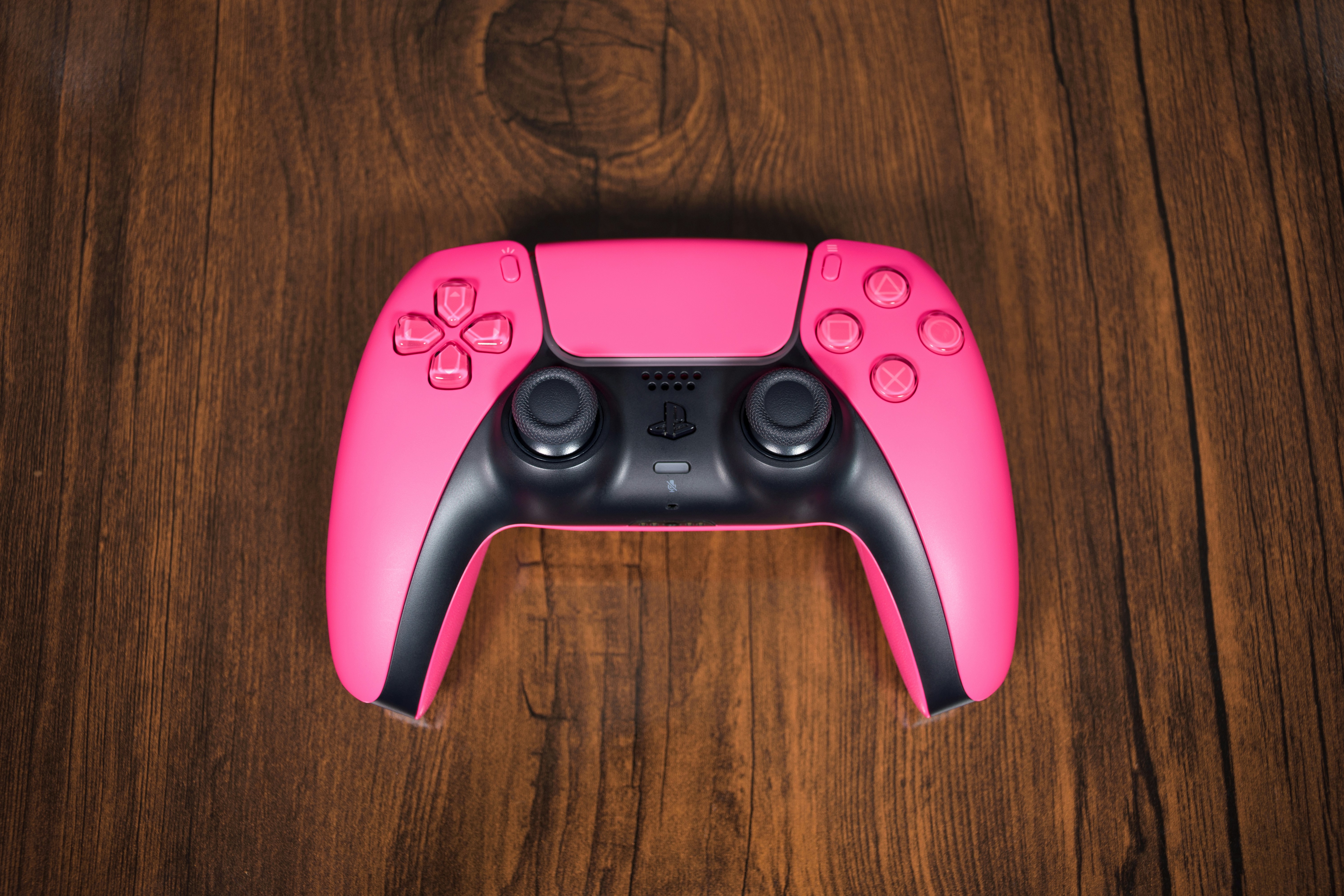 A pink video game controller photo – Free Dualsense controller Image on ...