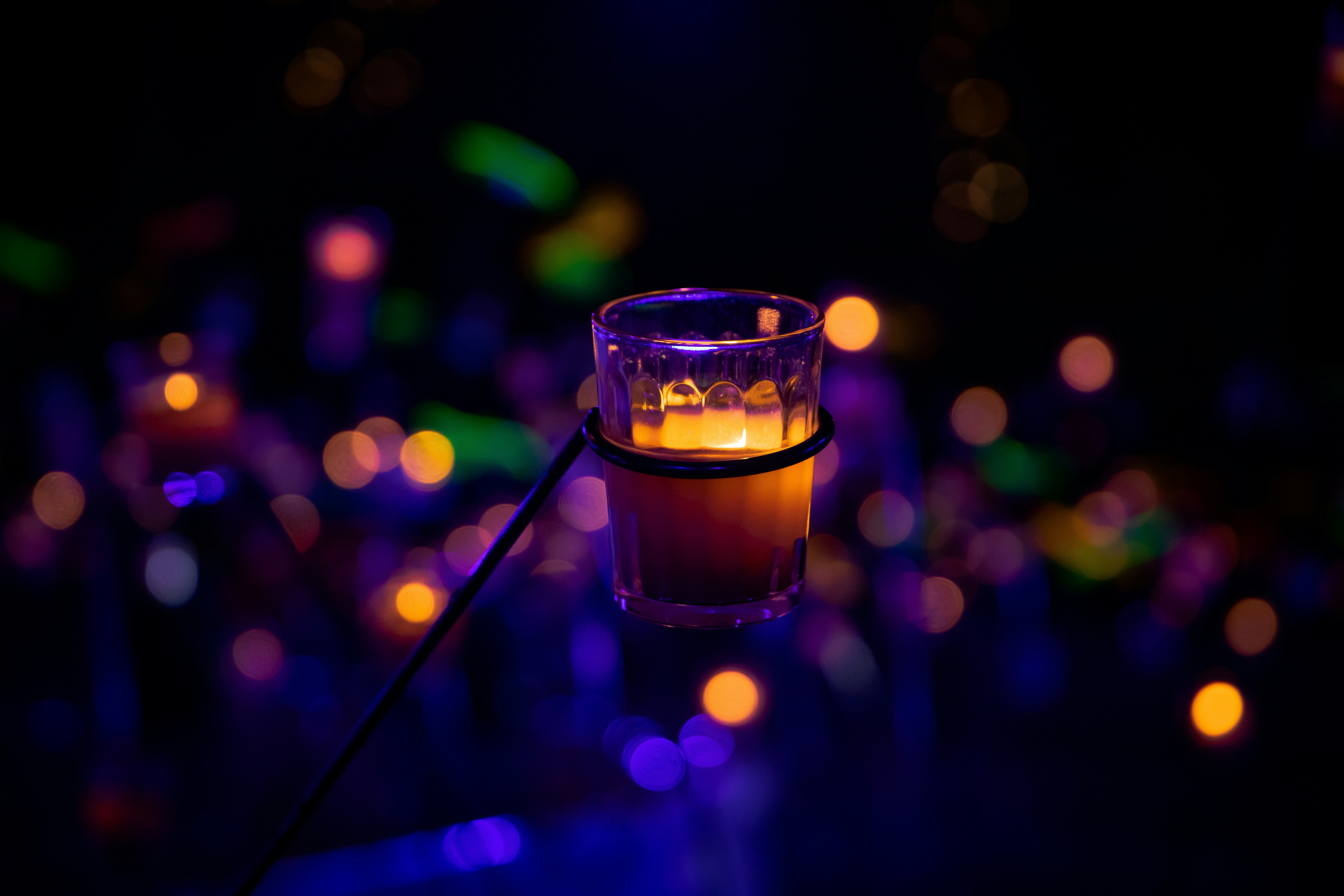 Glowing Lantern in a Sea of Neon Bokeh