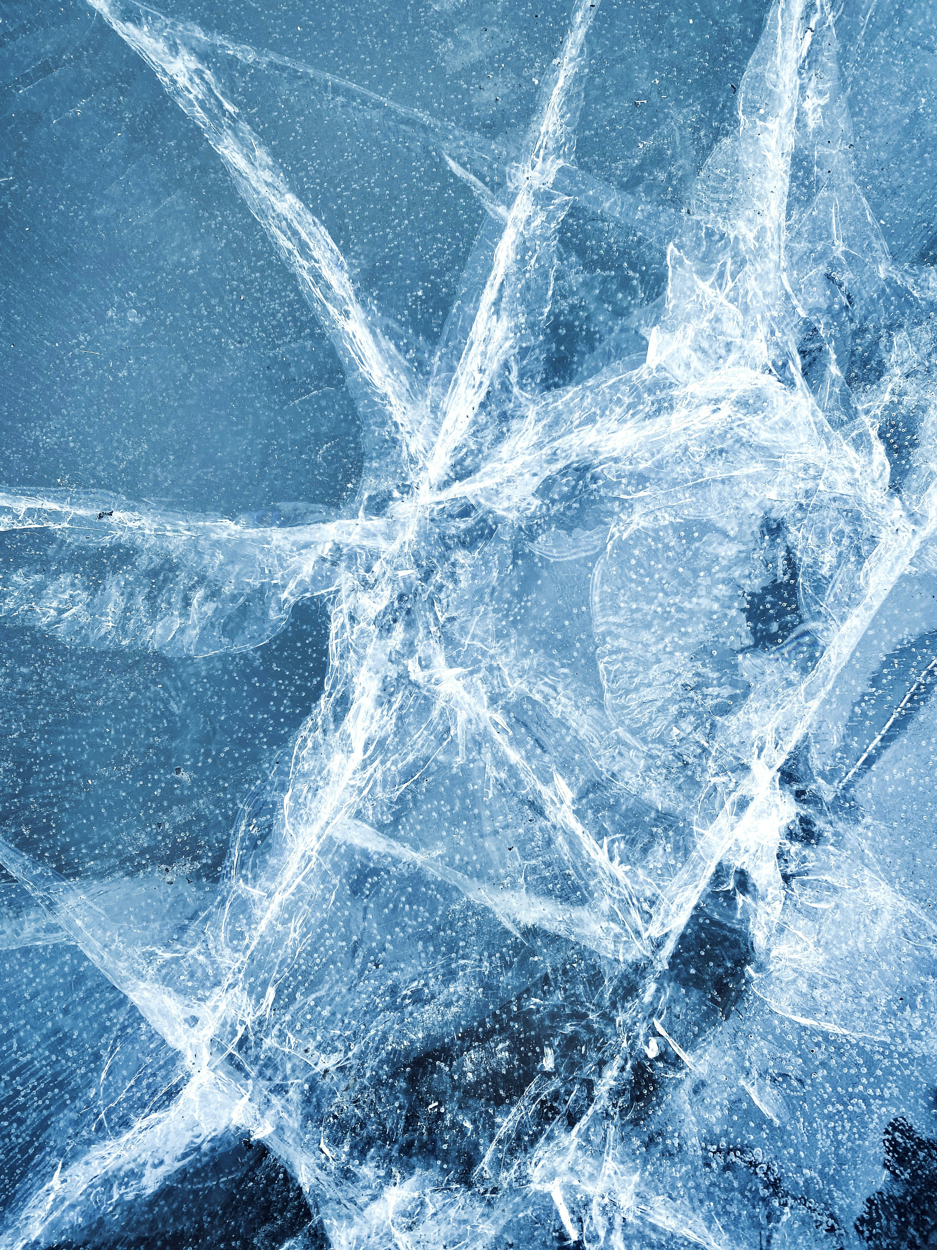 A close up of ice on a frozen surface photo – Free Pattern Image on ...