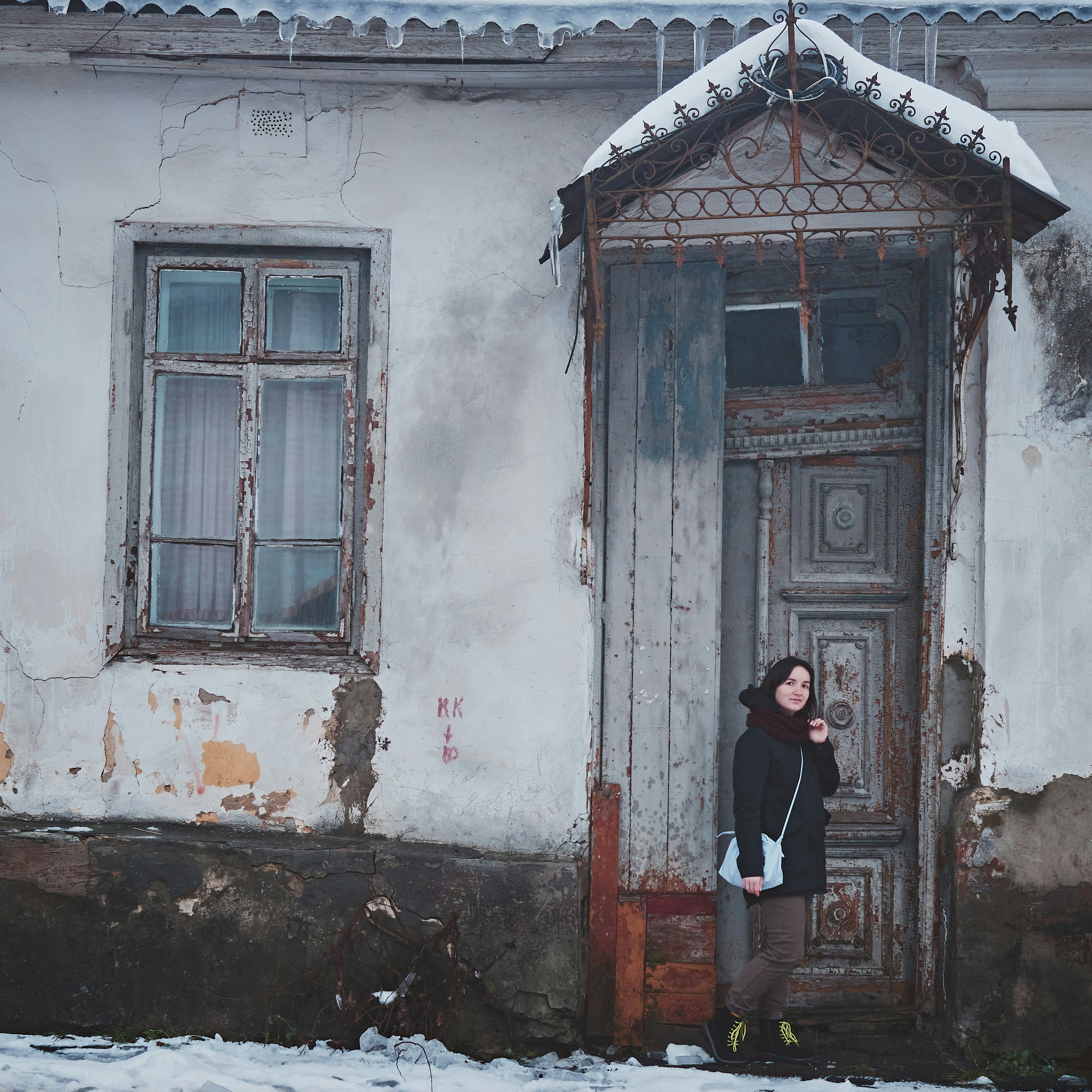 Quiet Resilience at the Worn Doorway