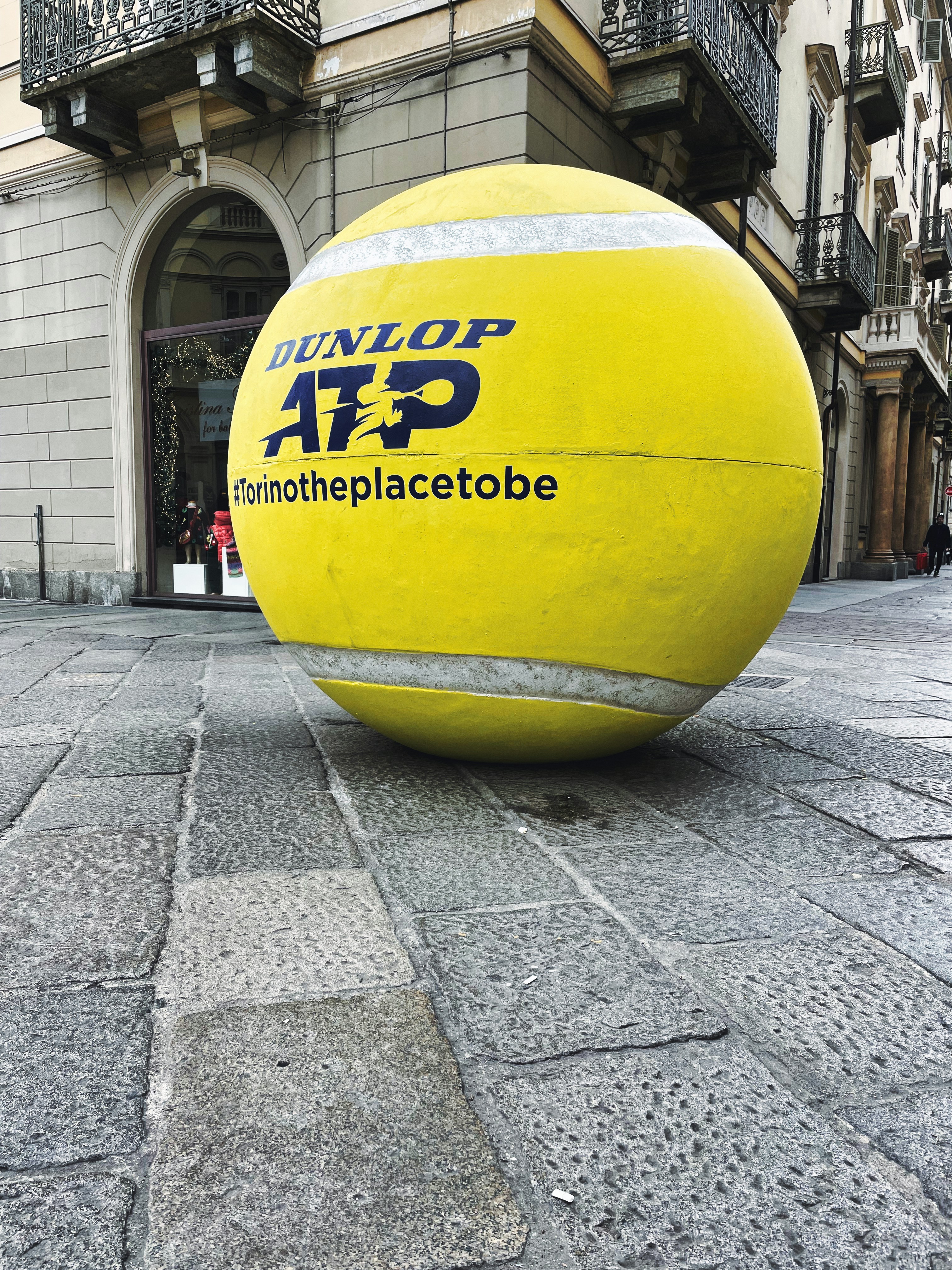 Turin’s Giant Yellow Ball Anchors a Quiet Street