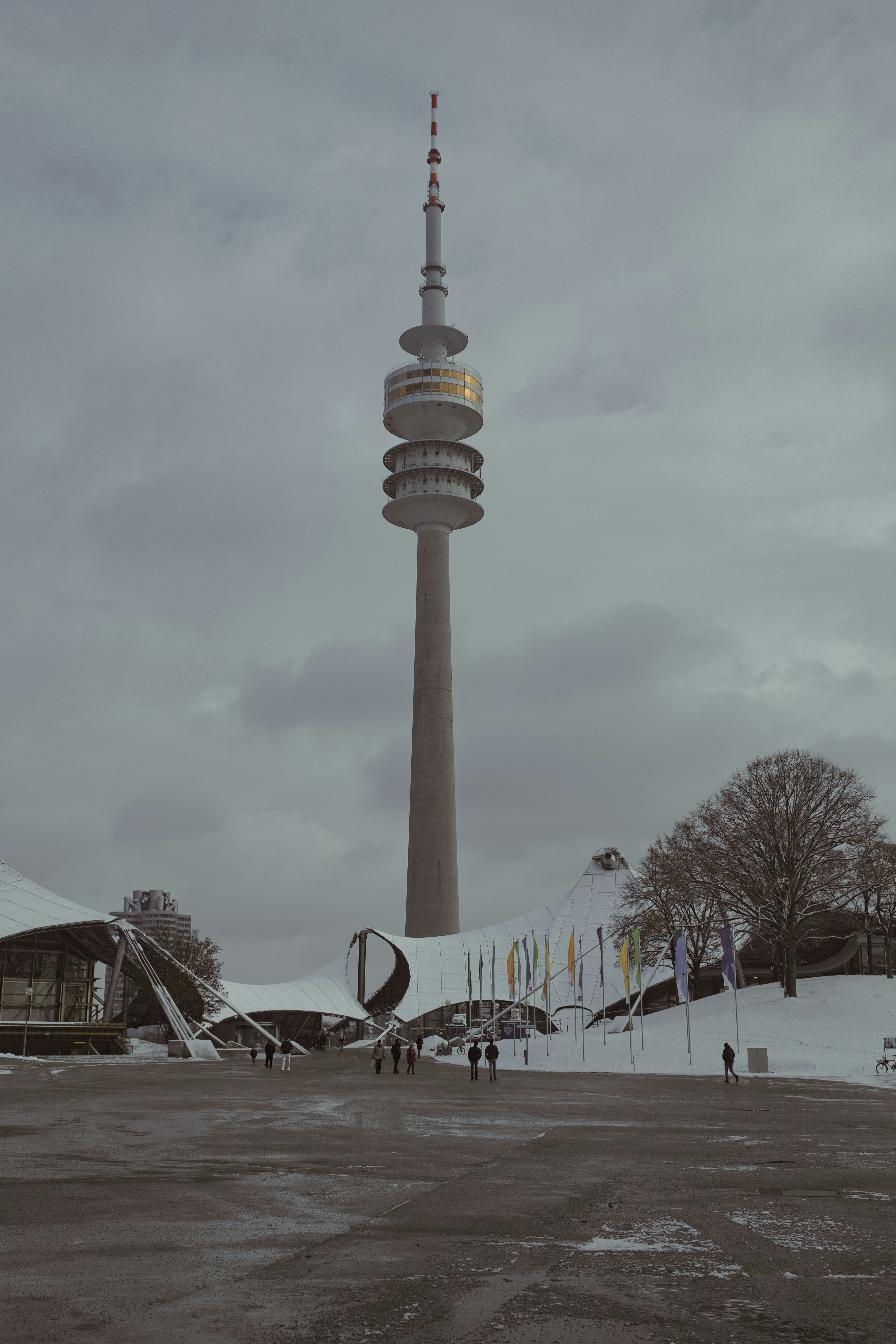 A tall tower with a clock on top of it photo – Free Olympiapark münchen ...