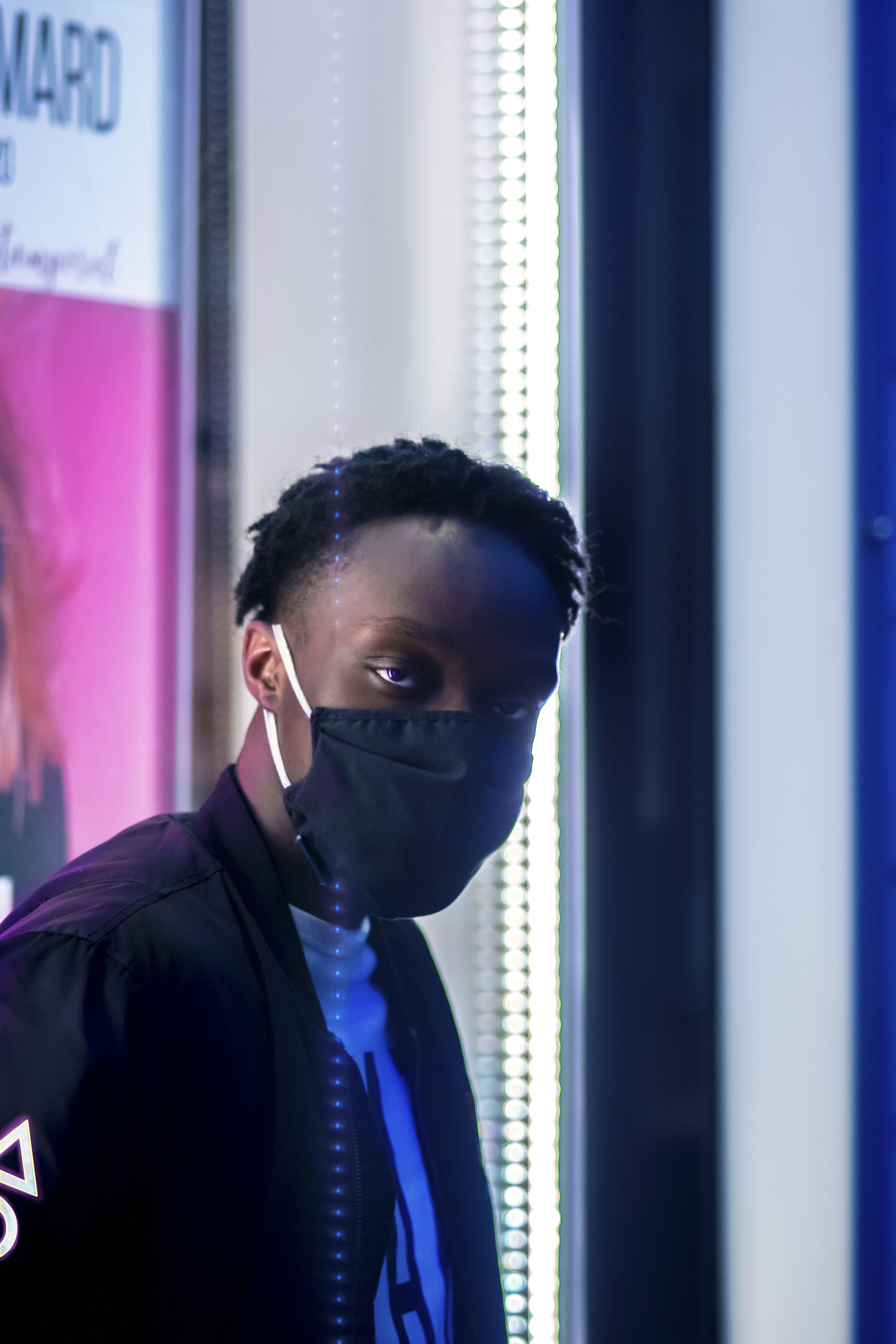 Neon Gaze by Fluorescent Strips: A Masked Portrait in Blue-Red Light