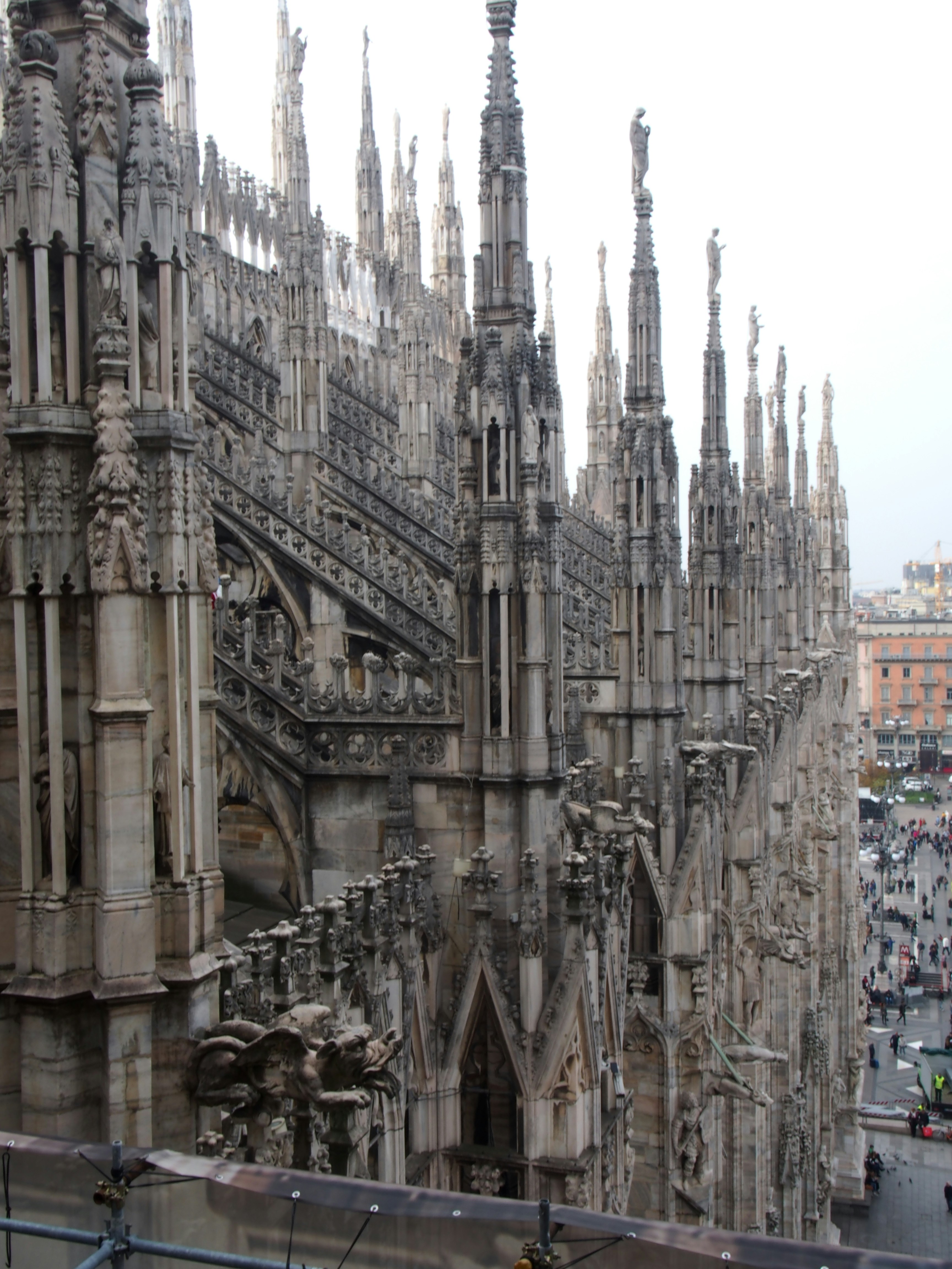 A very tall building with many spires on top of it photo – Free Italy ...