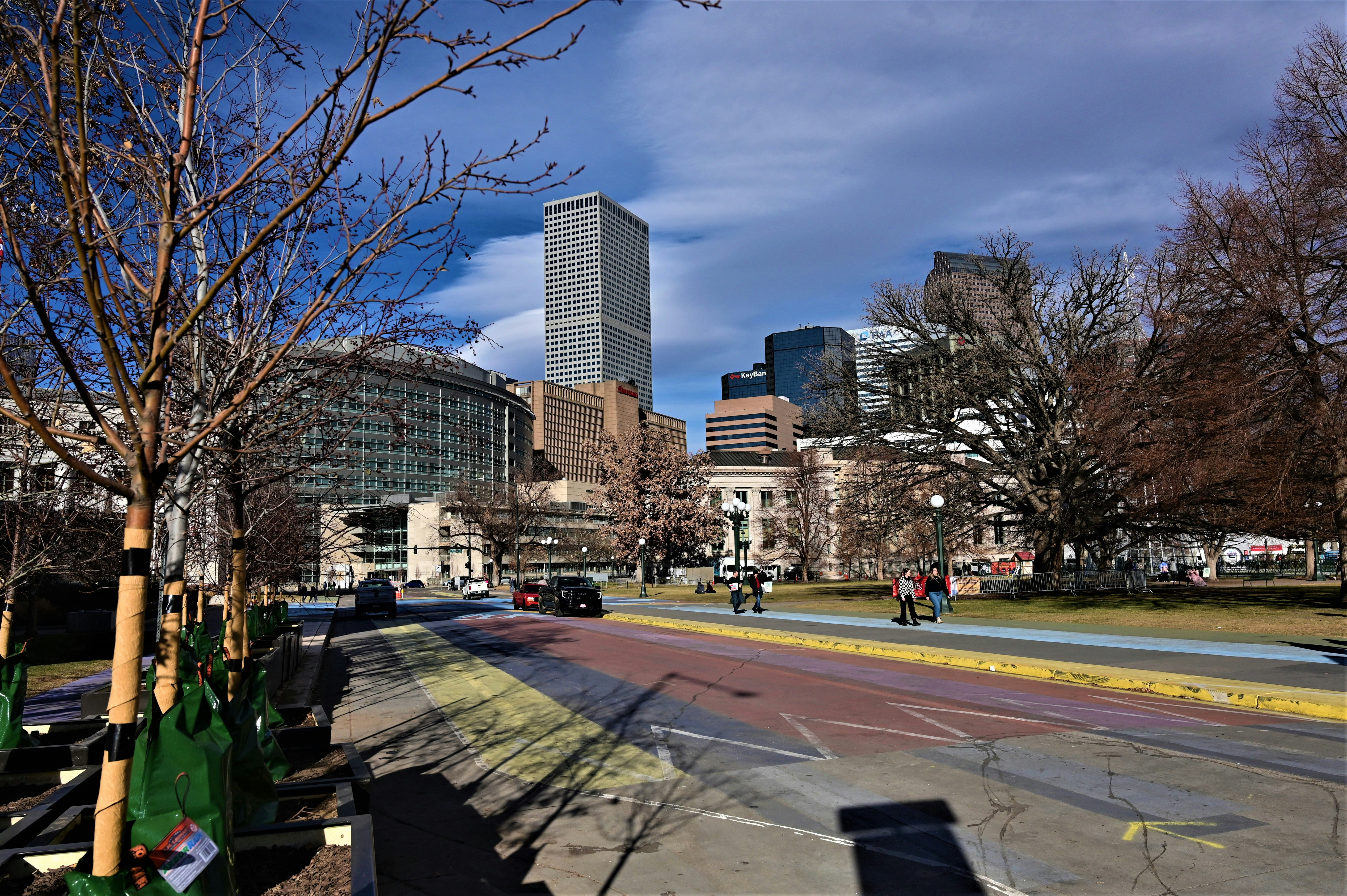 A city street with tall buildings in the background photo – Free Denver ...