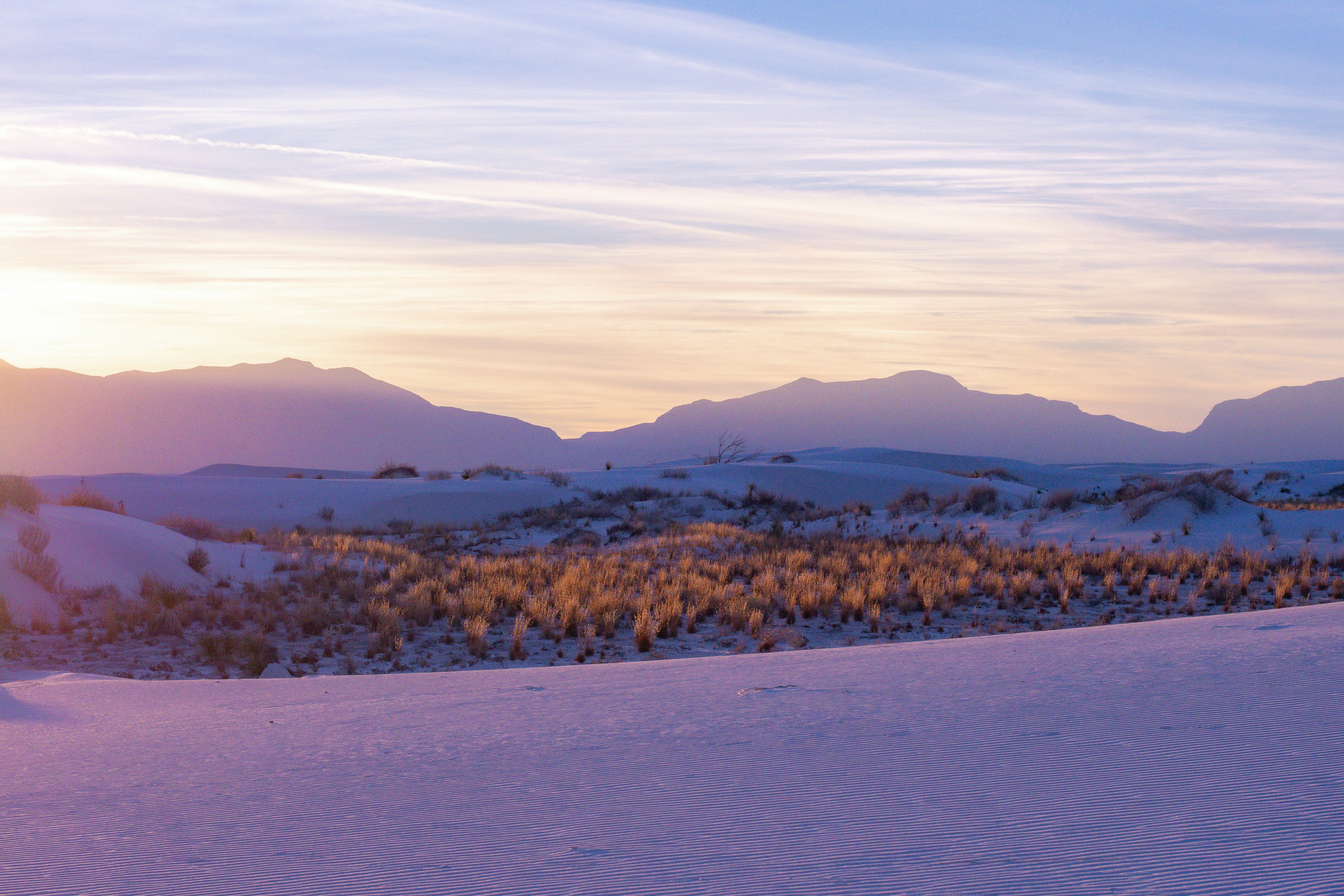 Dusk over frost-kissed dunes: a quiet desert twilight