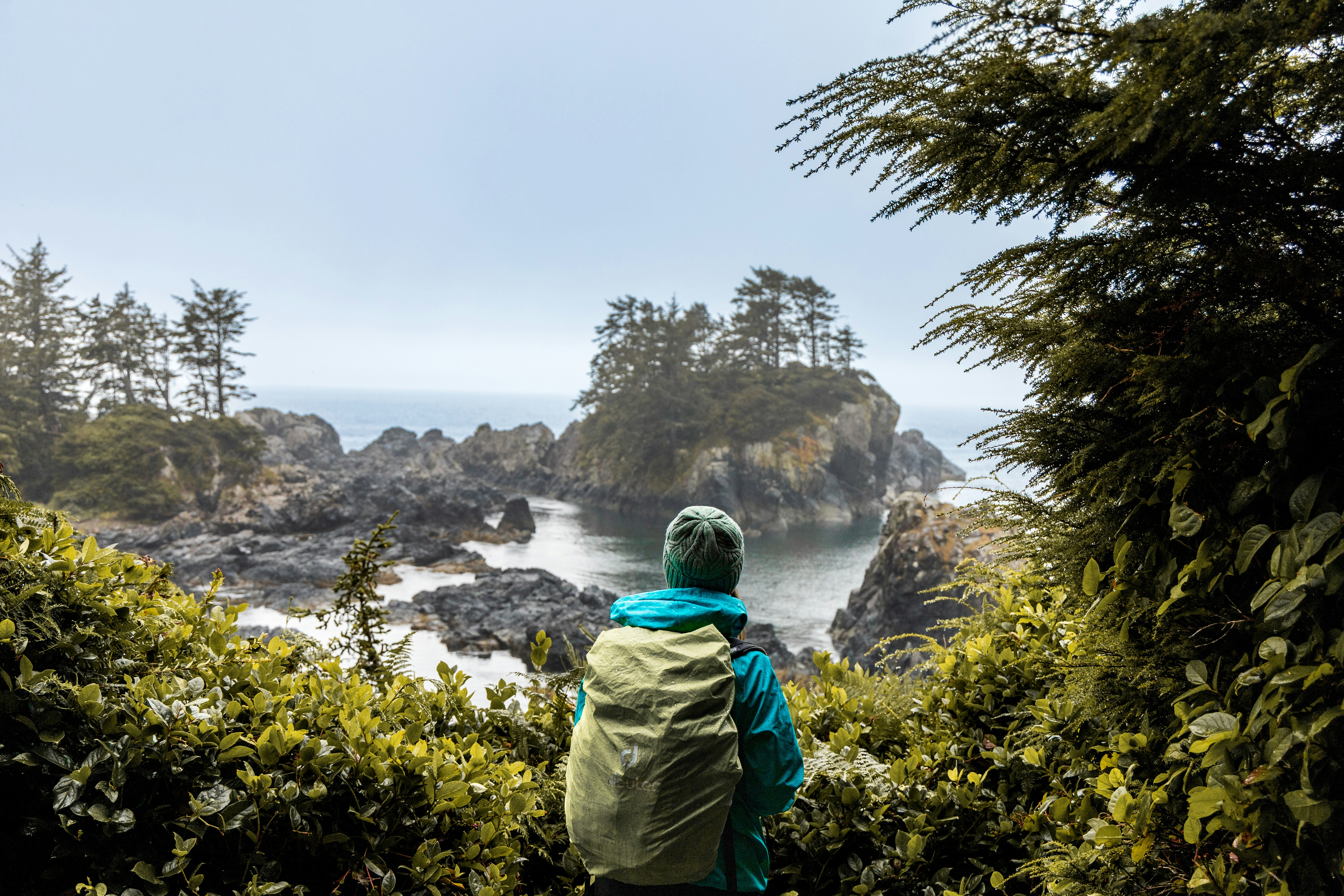 Gaze at the Edge: A Hiker's Quiet Threshold by the Sea