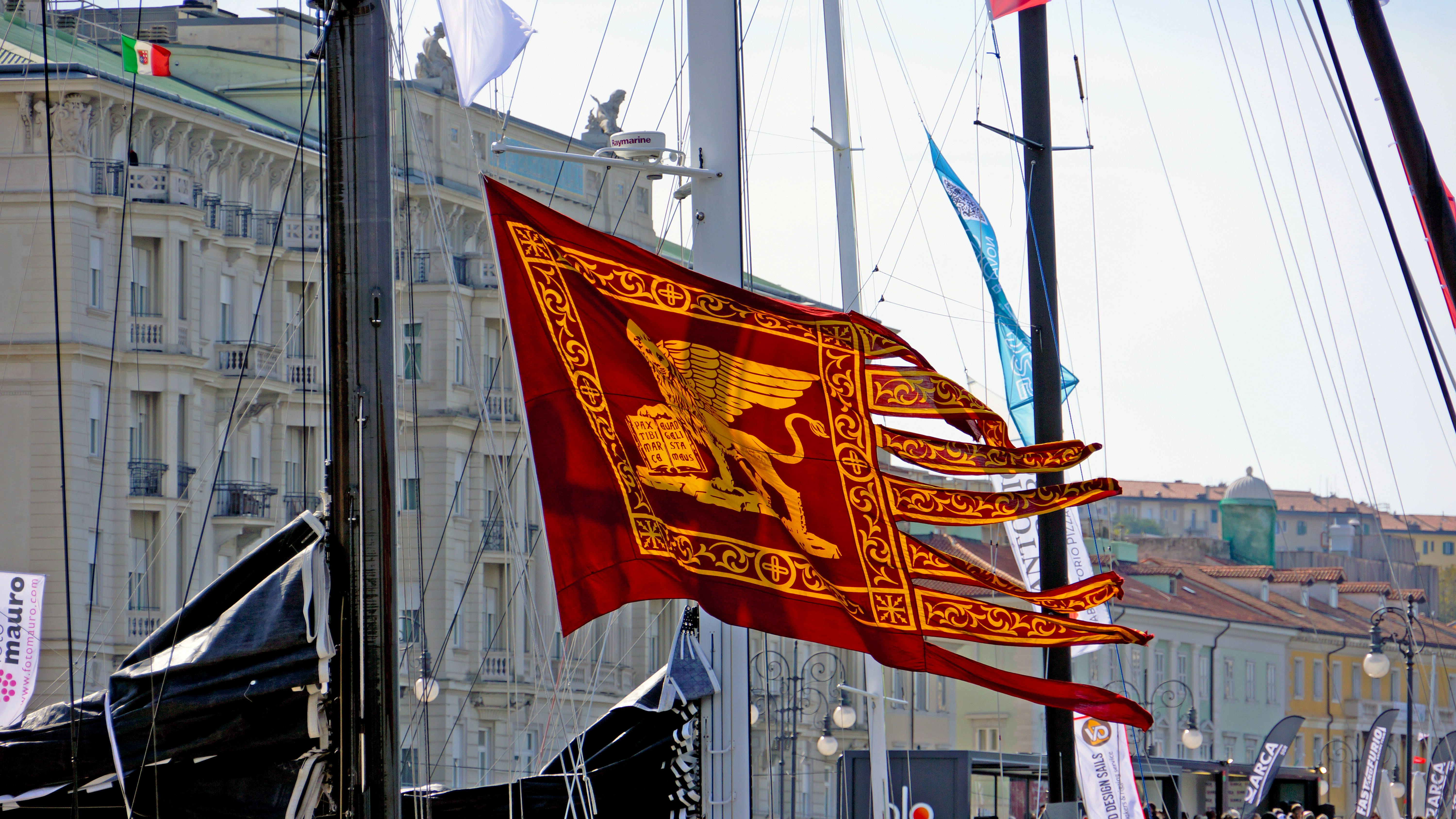 A red and gold flag with a lion on it photo – Free Flag Image on Unsplash