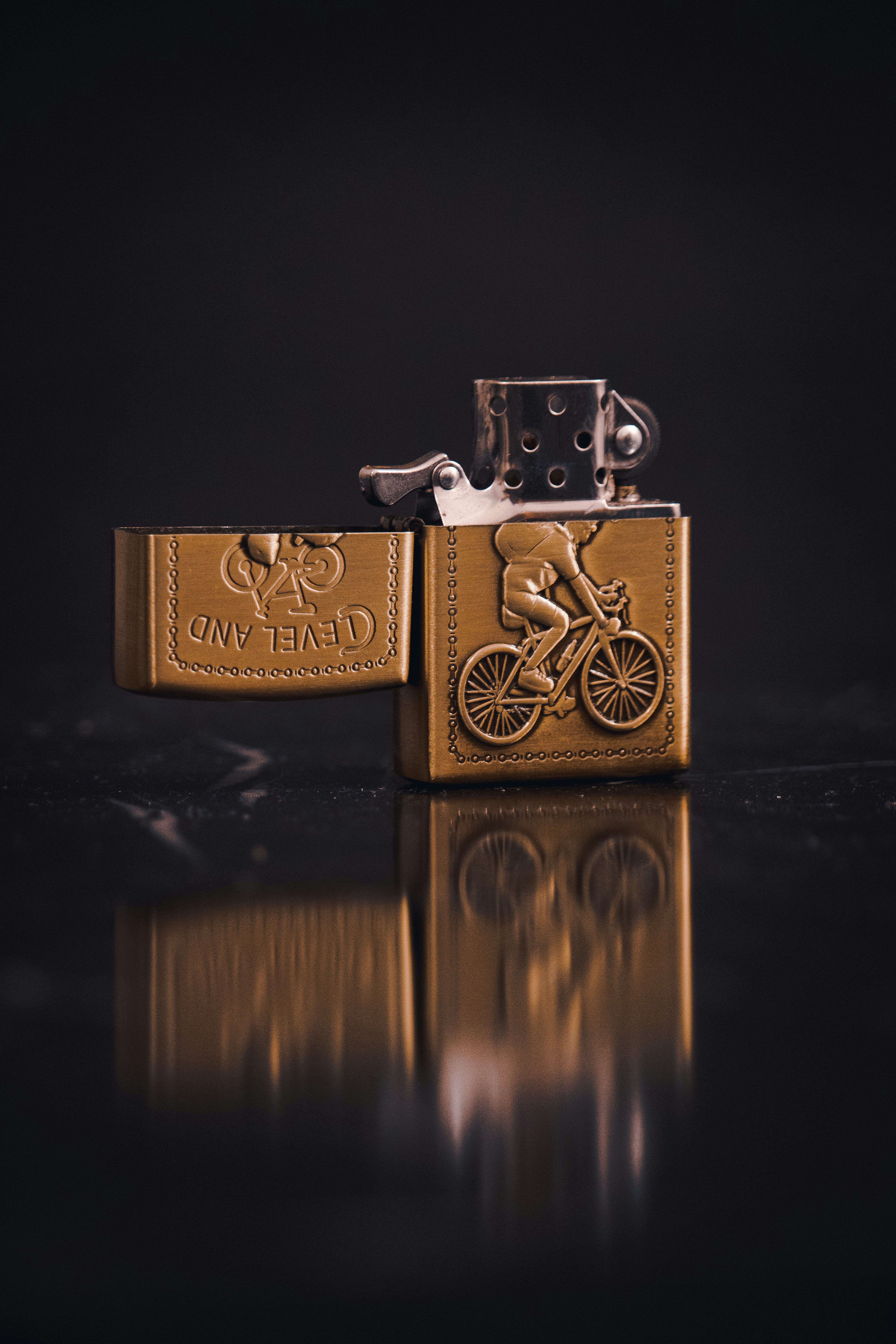 Ember-Relic: Brass Zippo Bearing a Bicycle Emblem and a Quiet Reflection