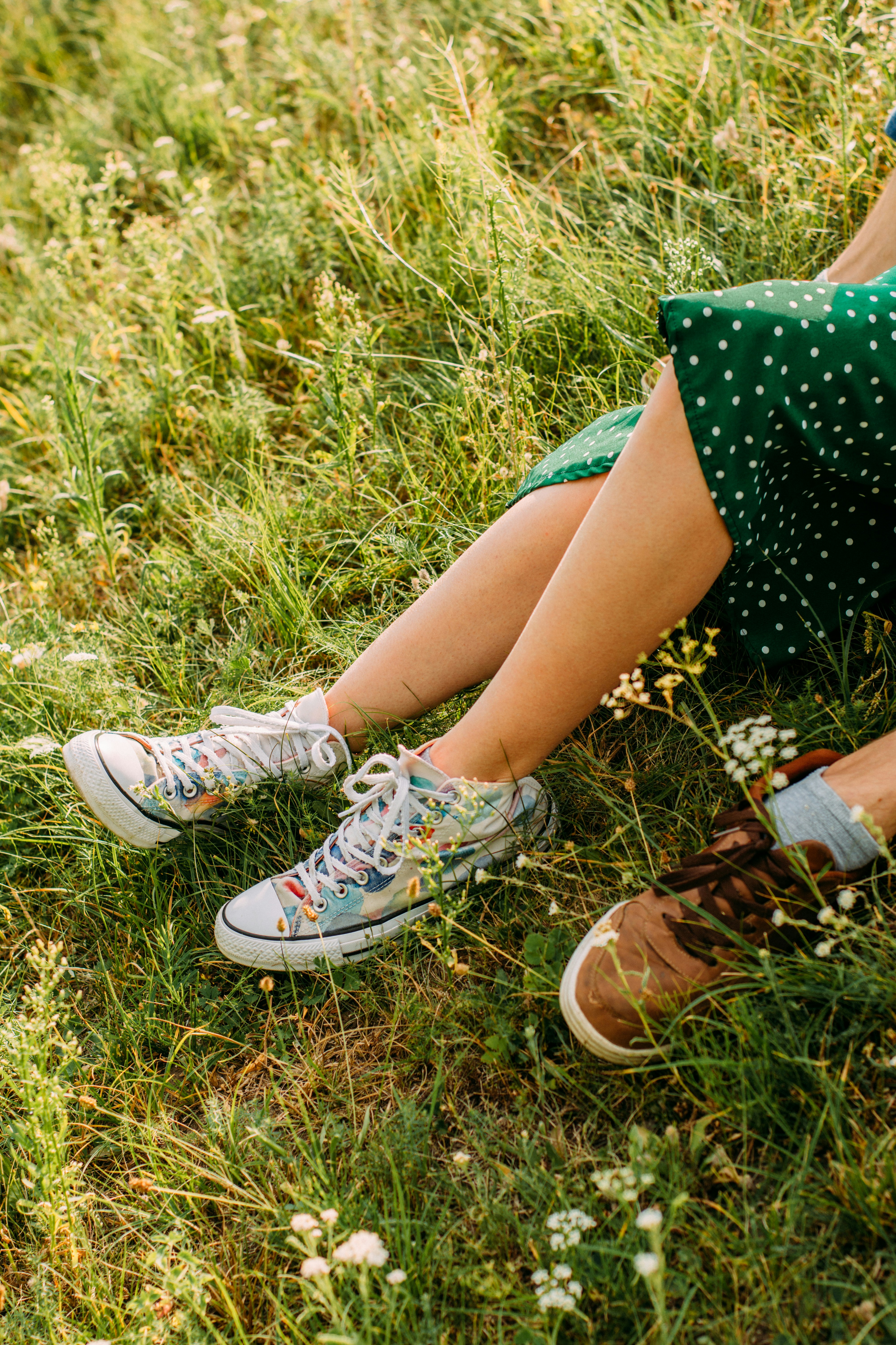Pastel Sneakers Resting Amid a Meadow of Wildflowers
