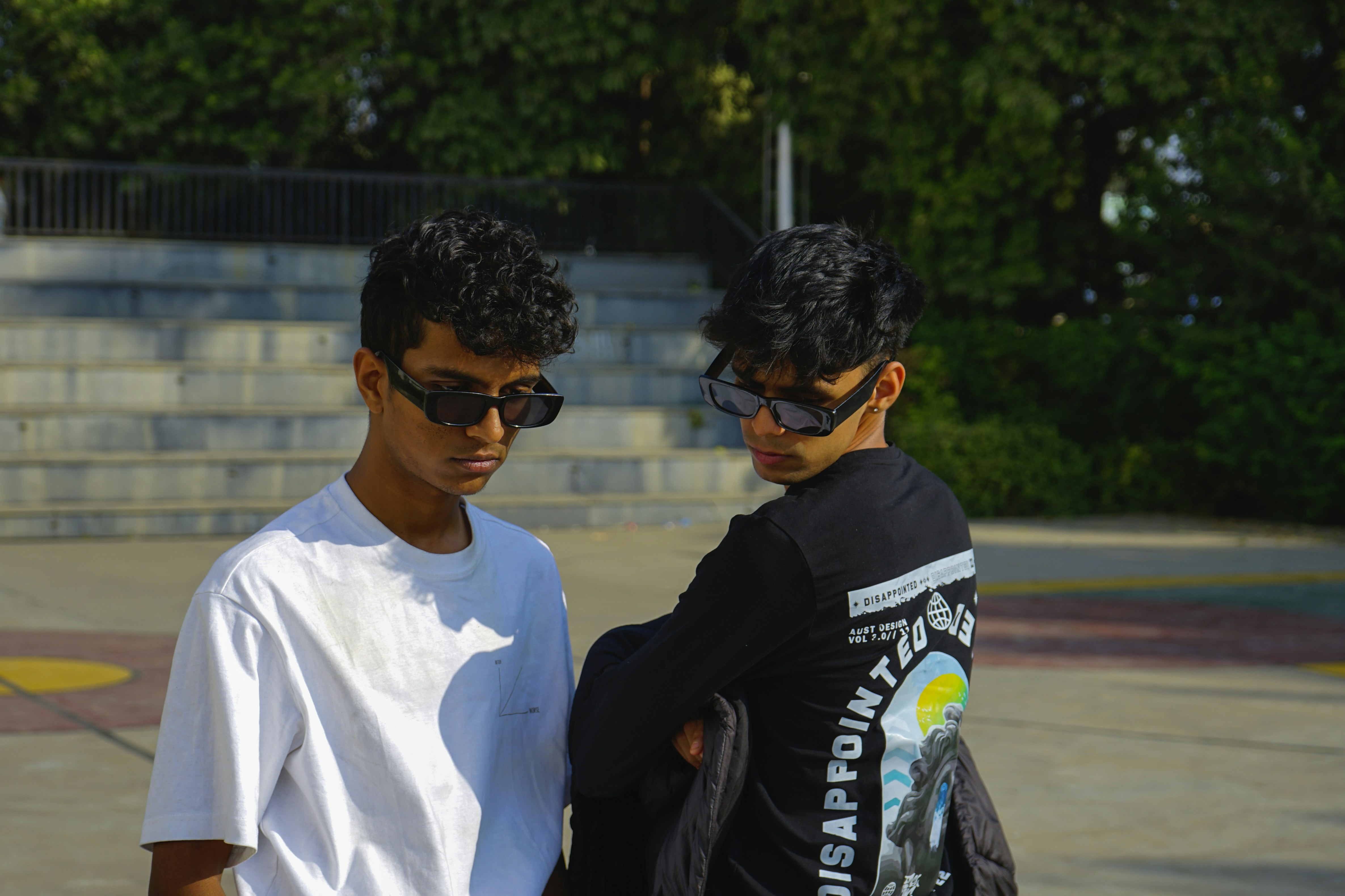 Two young men standing next to each other photo – Free Portrait Image ...