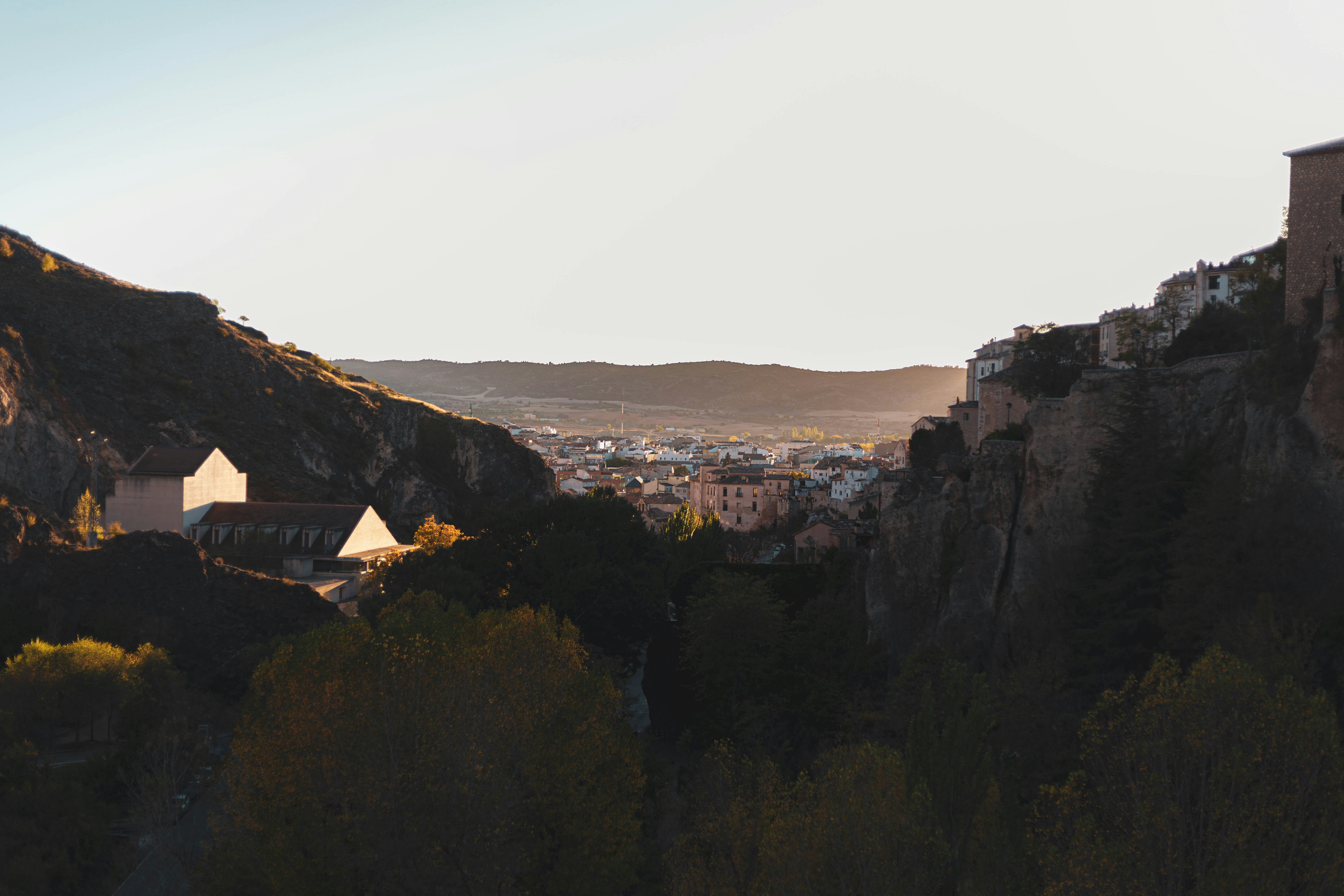 a view of a city from a hill