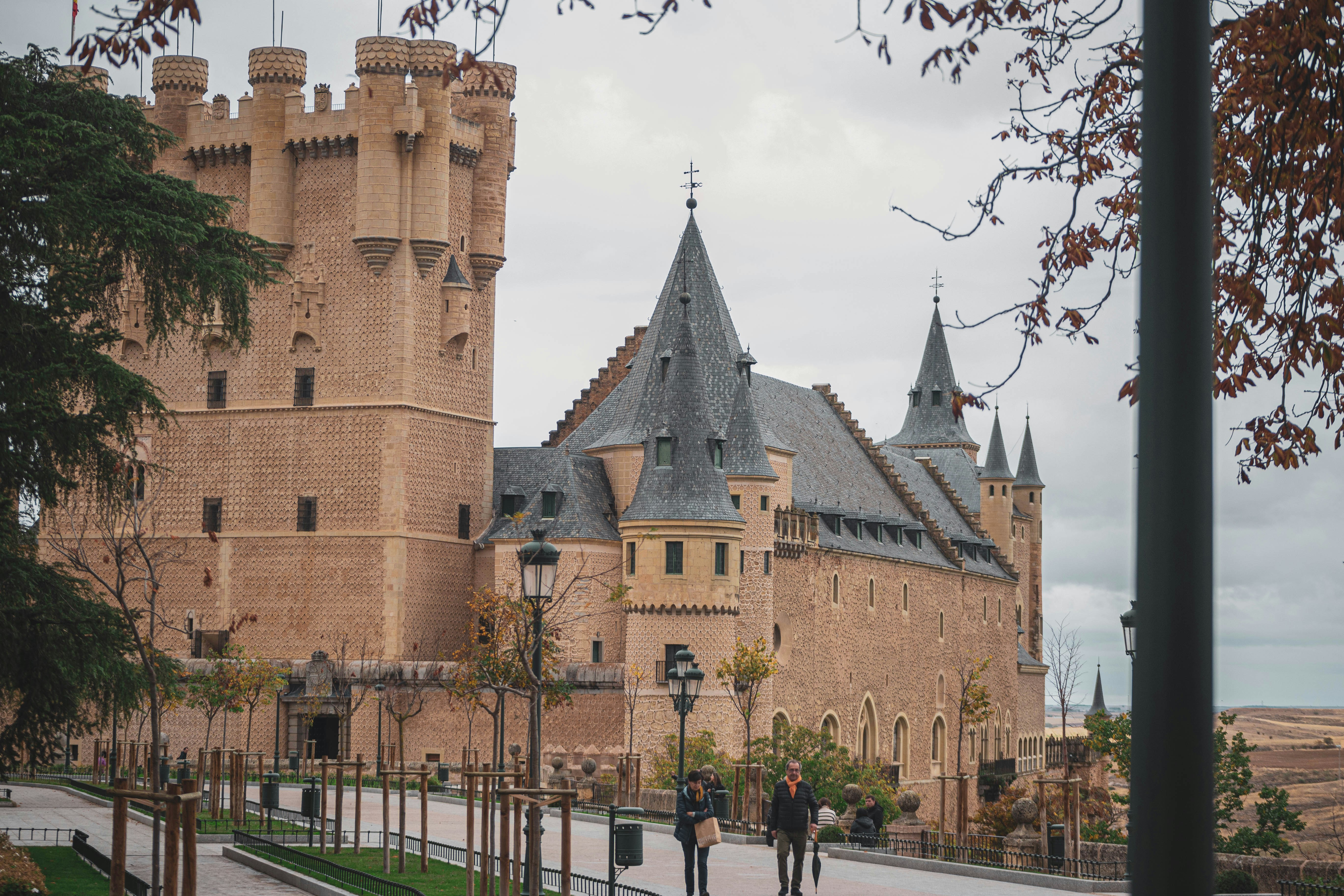 A large castle like building with a clock tower photo – Free Image on ...