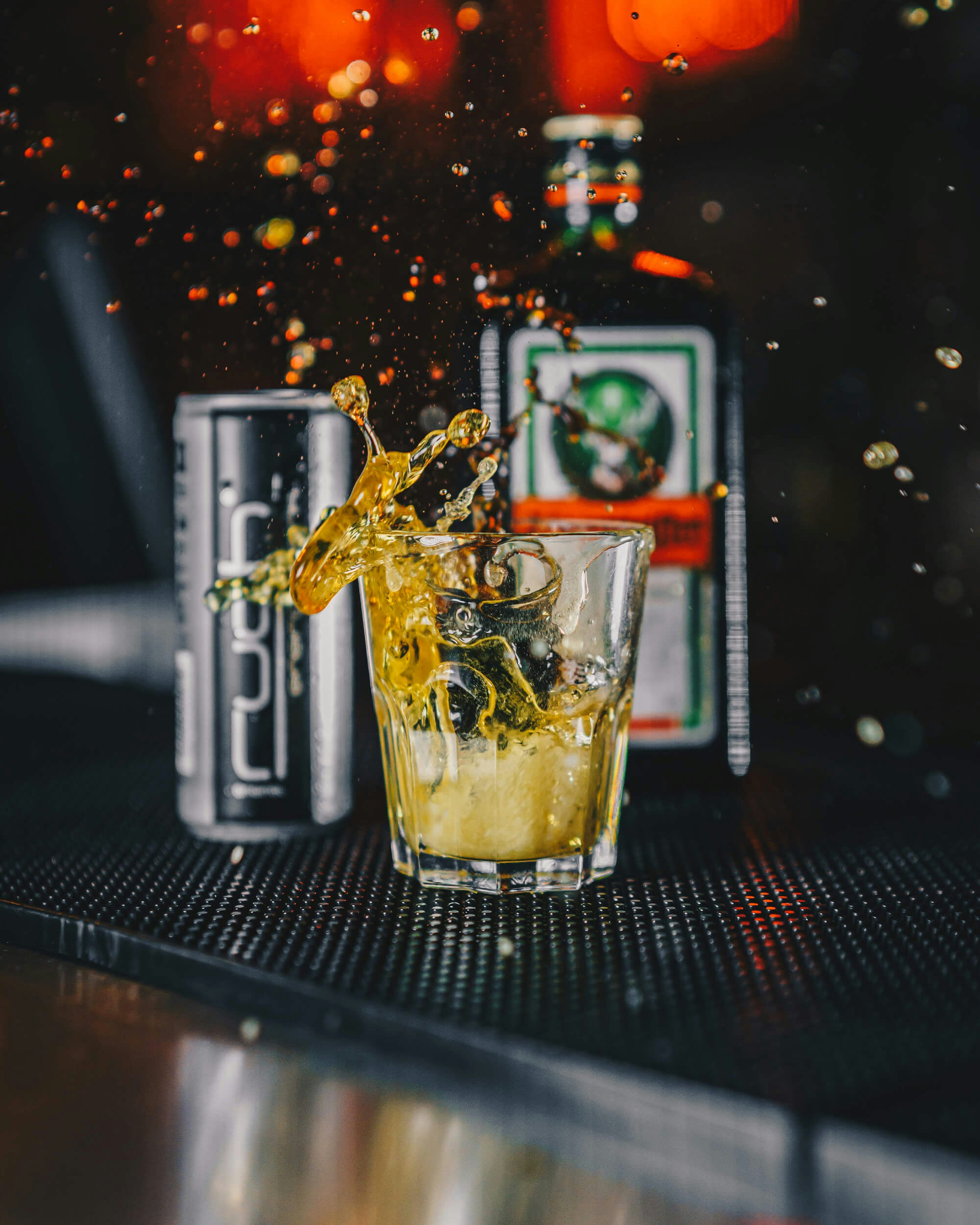 A glass filled with liquid next to a can of soda photo – Free Beverage ...